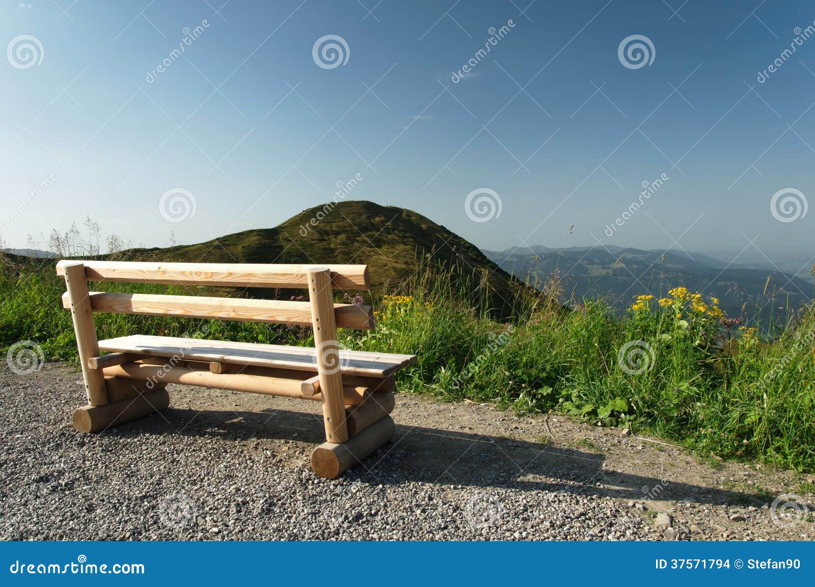 Bench in the Alps stock photo. Image of coast, horizontal - 37571794