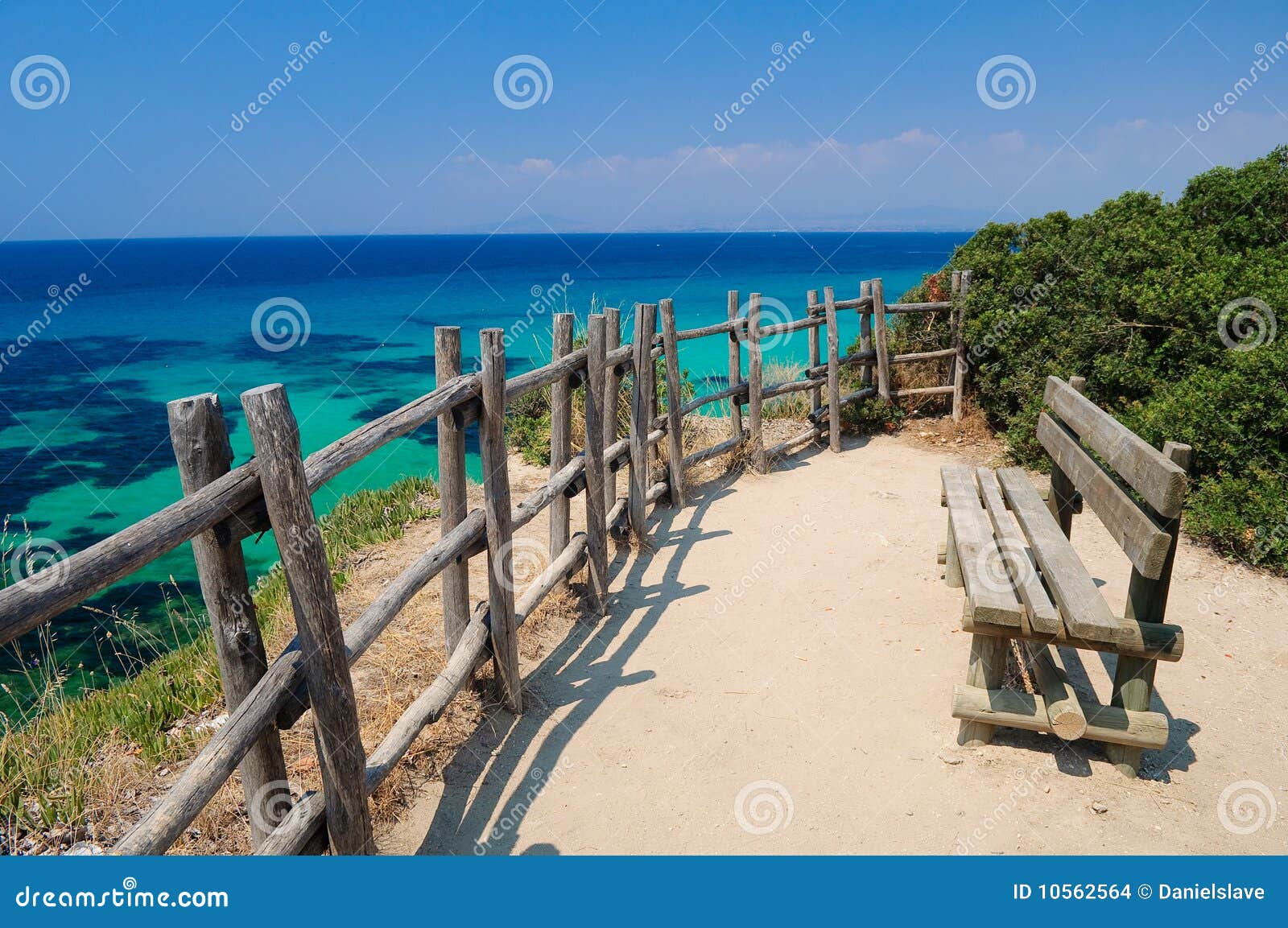Bench at the beach stock photo. Image of skyline, fence - 10562564