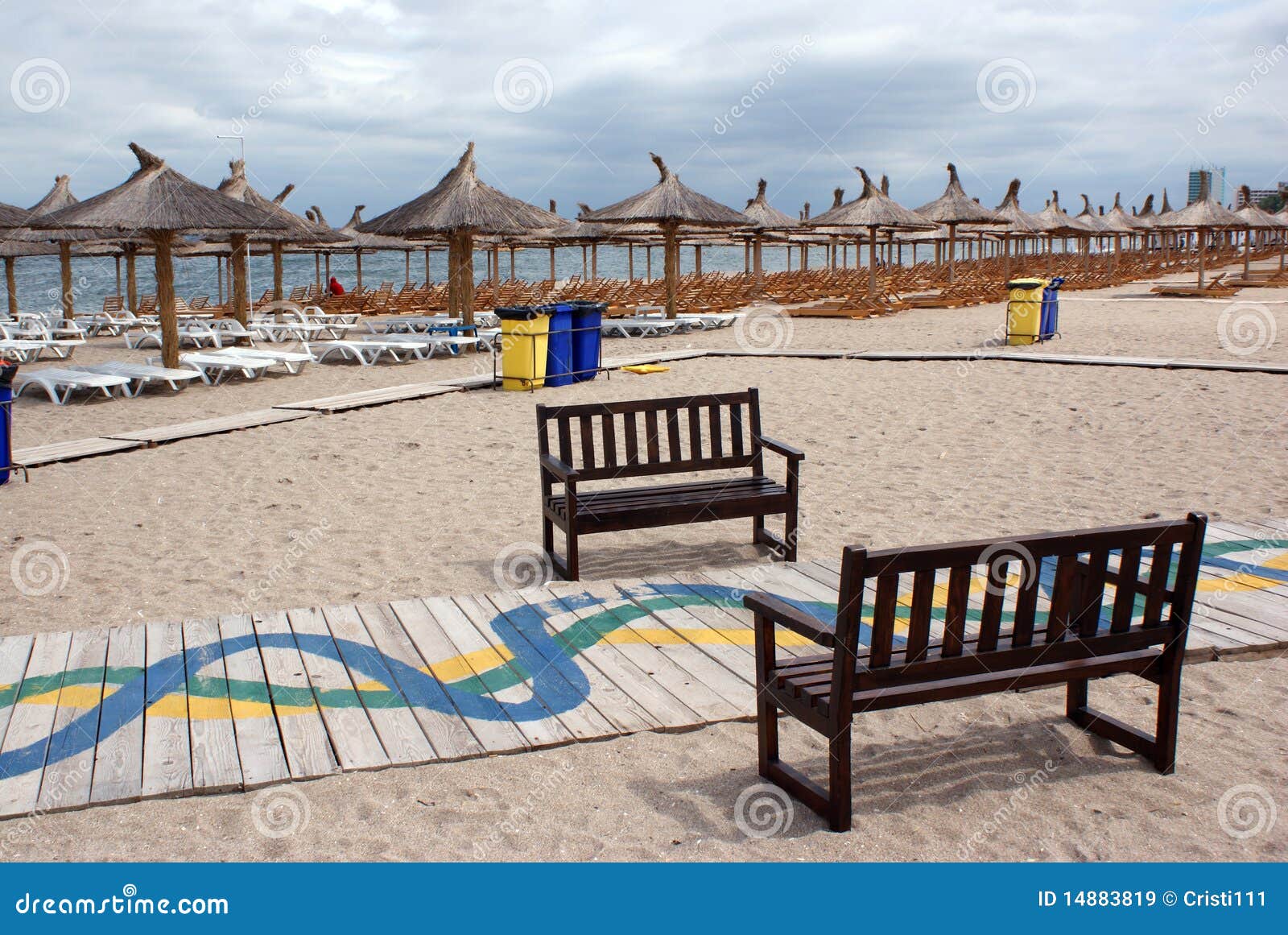 Bench on the beach stock image. Image of clouded, bench - 14883819