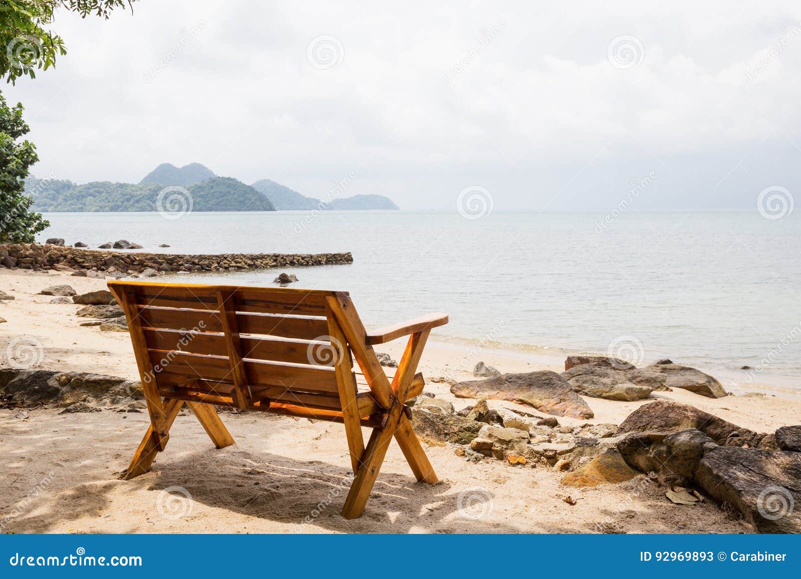 Bench on the beach stock image. Image of sunlight, sand - 92969893