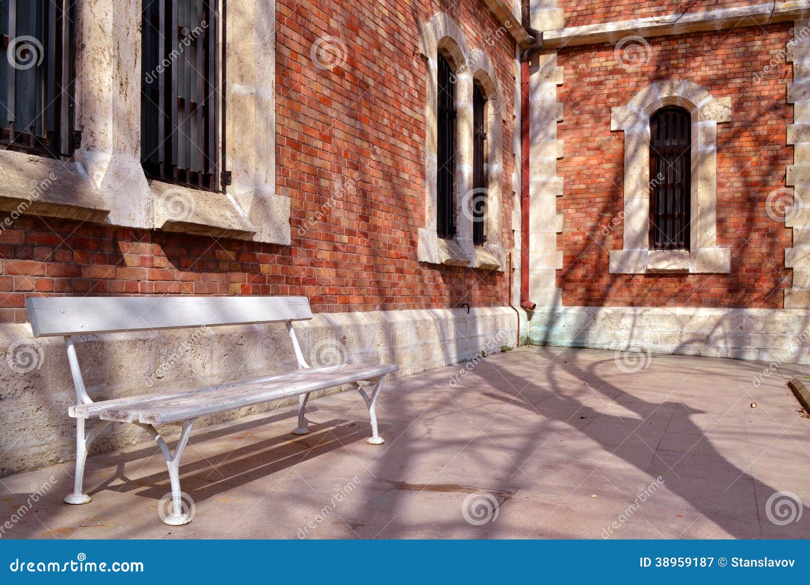Bench stock image. Image of family, face, europe, bricks - 38959187