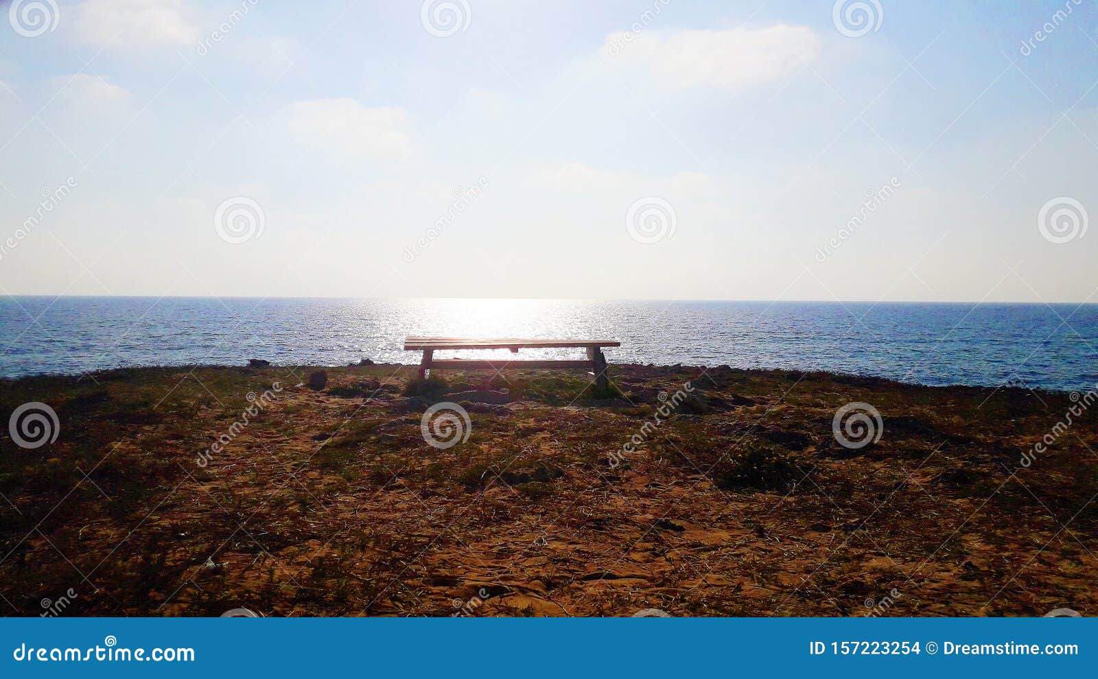 A Bench on a Cliff Looking at the Ocean Stock Photo - Image of cliff ...