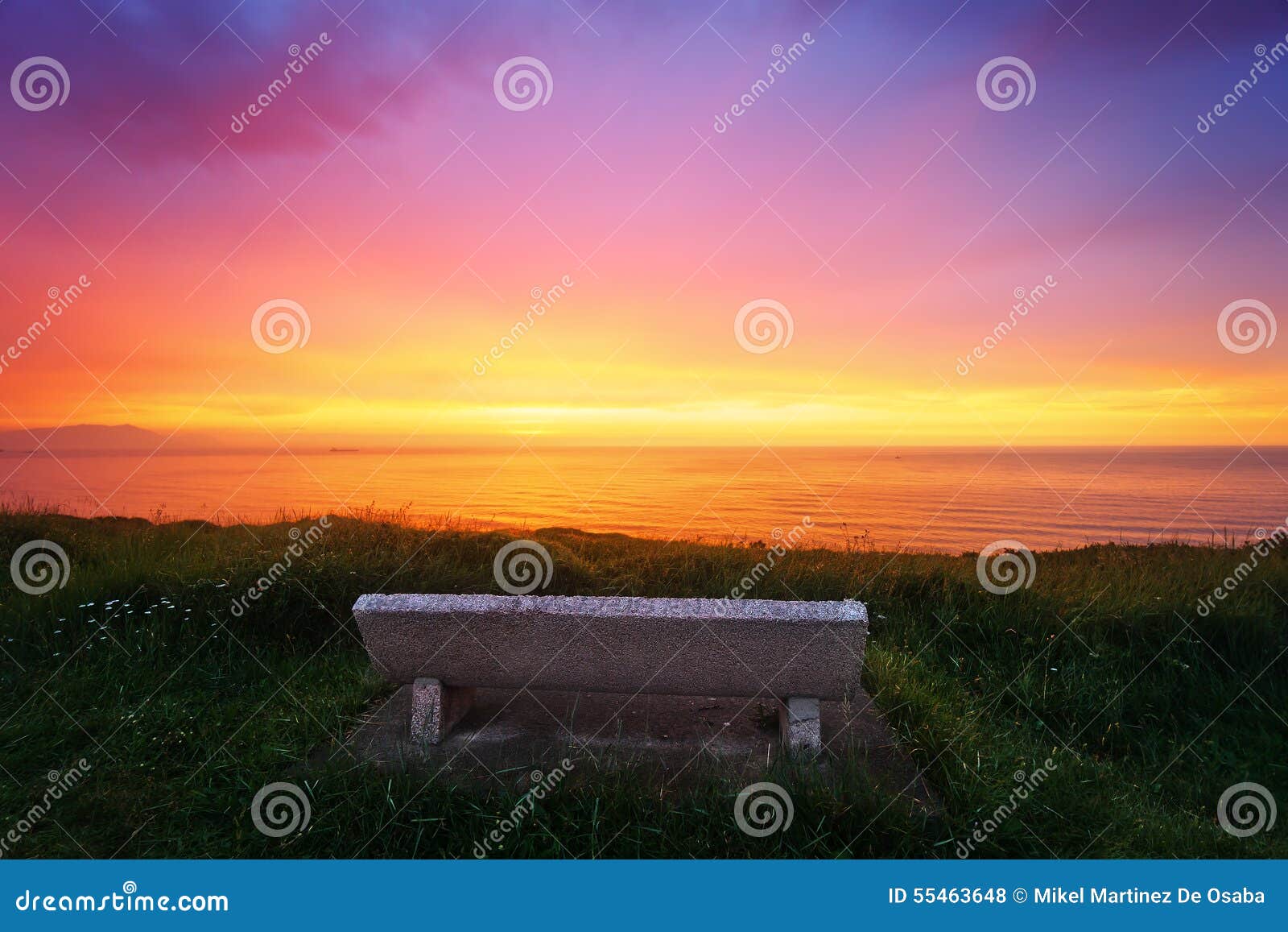Bench on cliff at sunset stock photo. Image of view, basque - 55463648