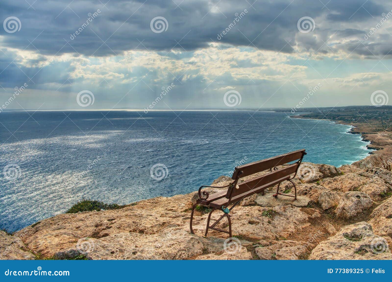 Bench on Edge of Cliff Overlooking Sea Stock Image - Image of nature ...