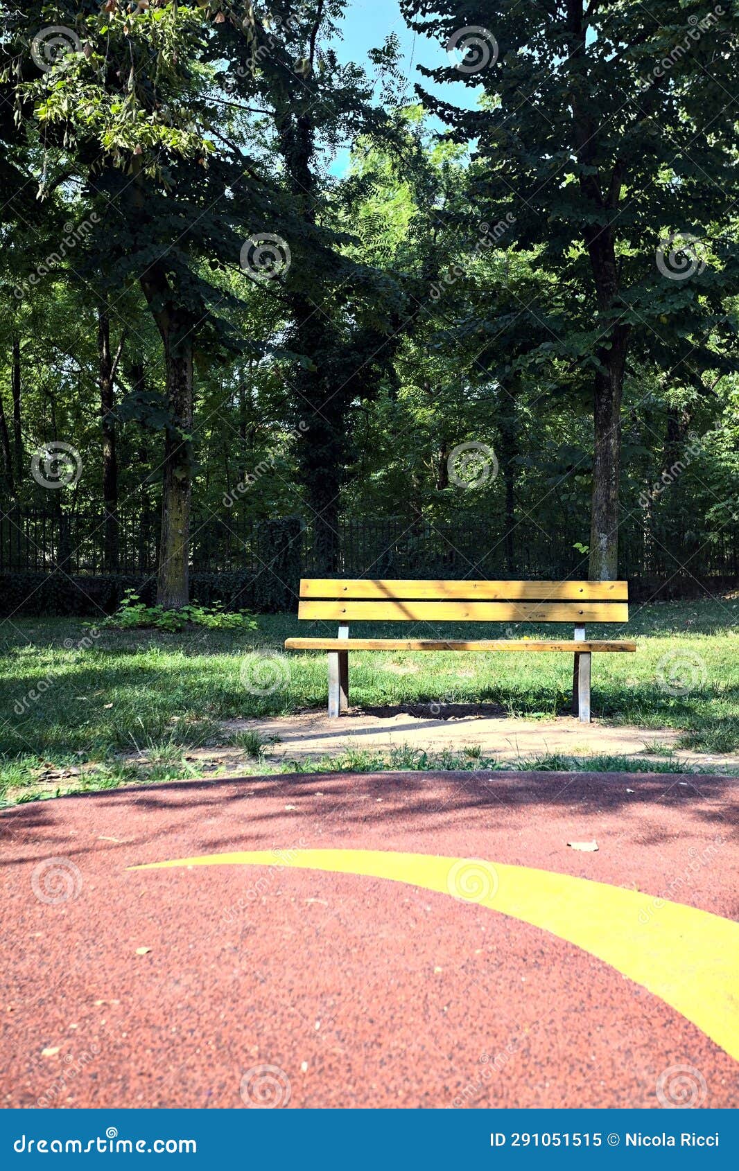 Bench by the Edge of a Playground in a Park Stock Image - Image of path ...