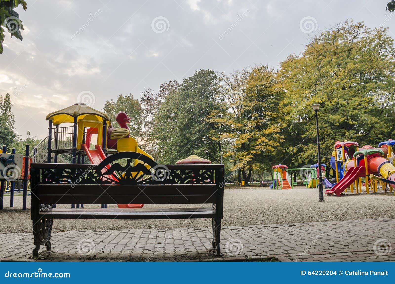 Bench facing playground stock photo. Image of autumn - 64220204