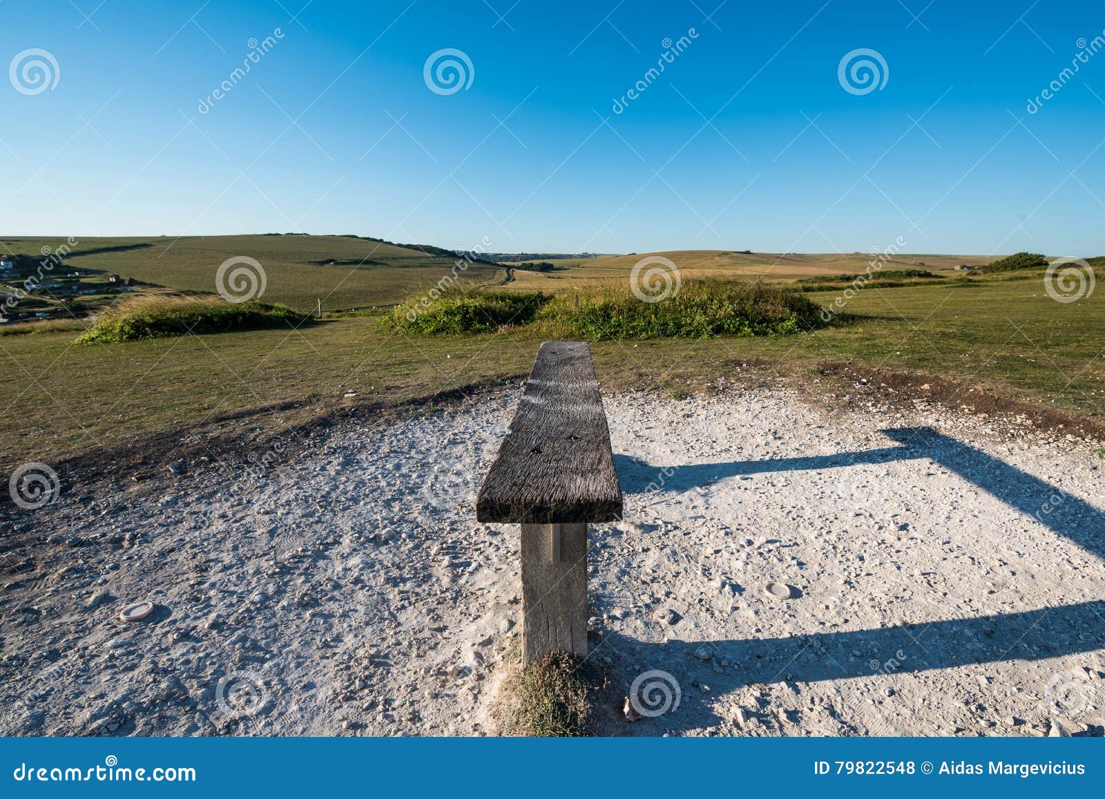 Bench in the field stock photo. Image of natural, clear - 79822548