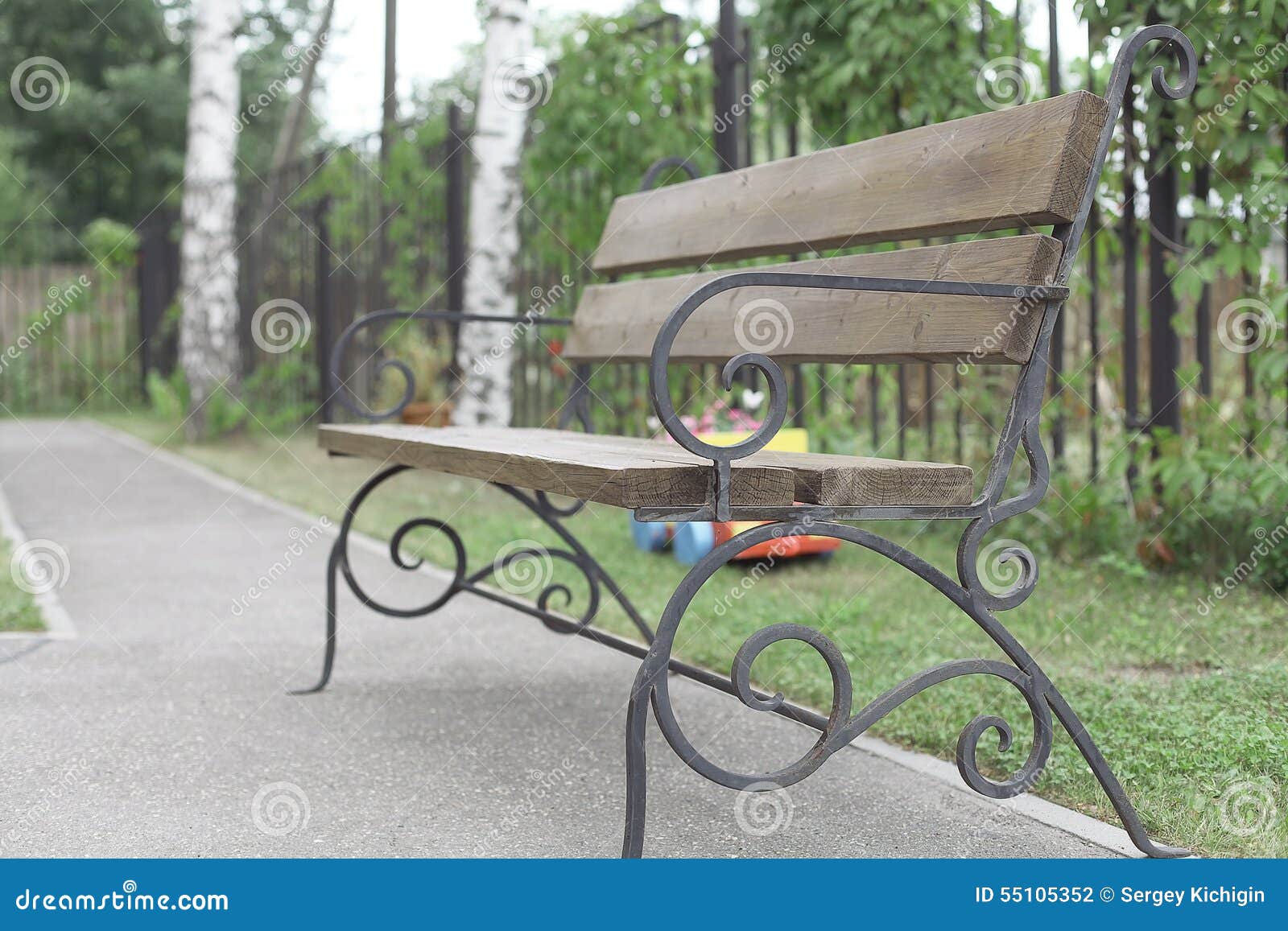 Bench on footpath stock photo. Image of blossom, fresh - 55105352