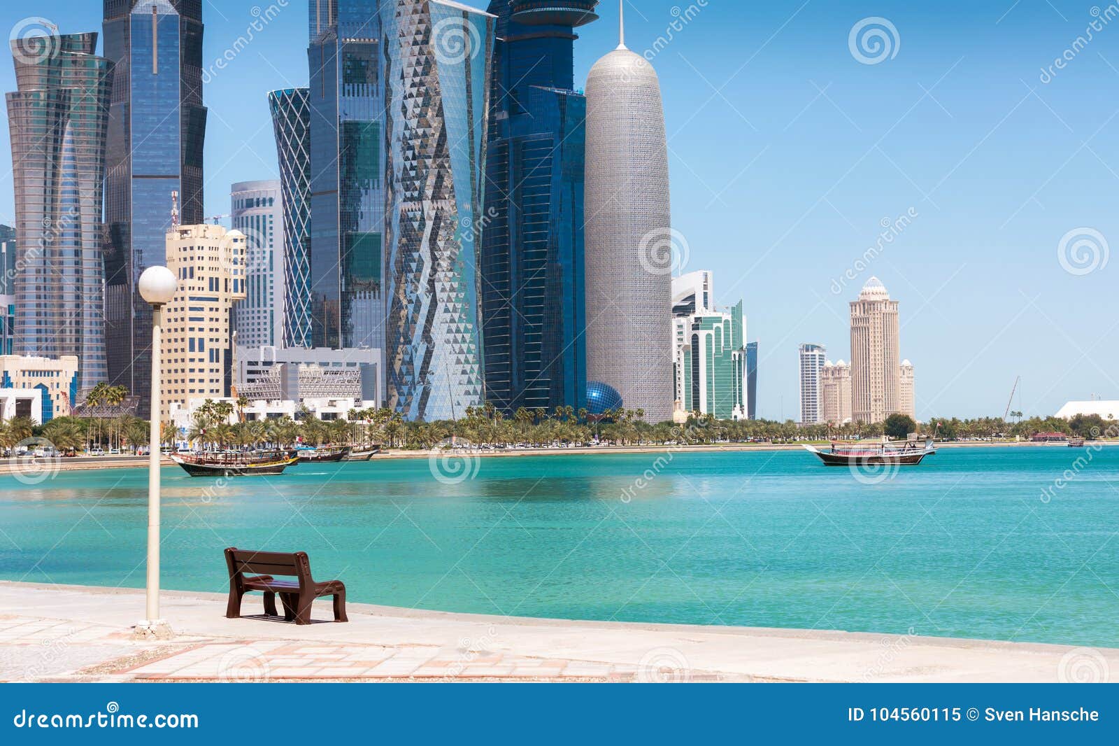 A Bench in Front of the Skyline of Doha Stock Image - Image of ...