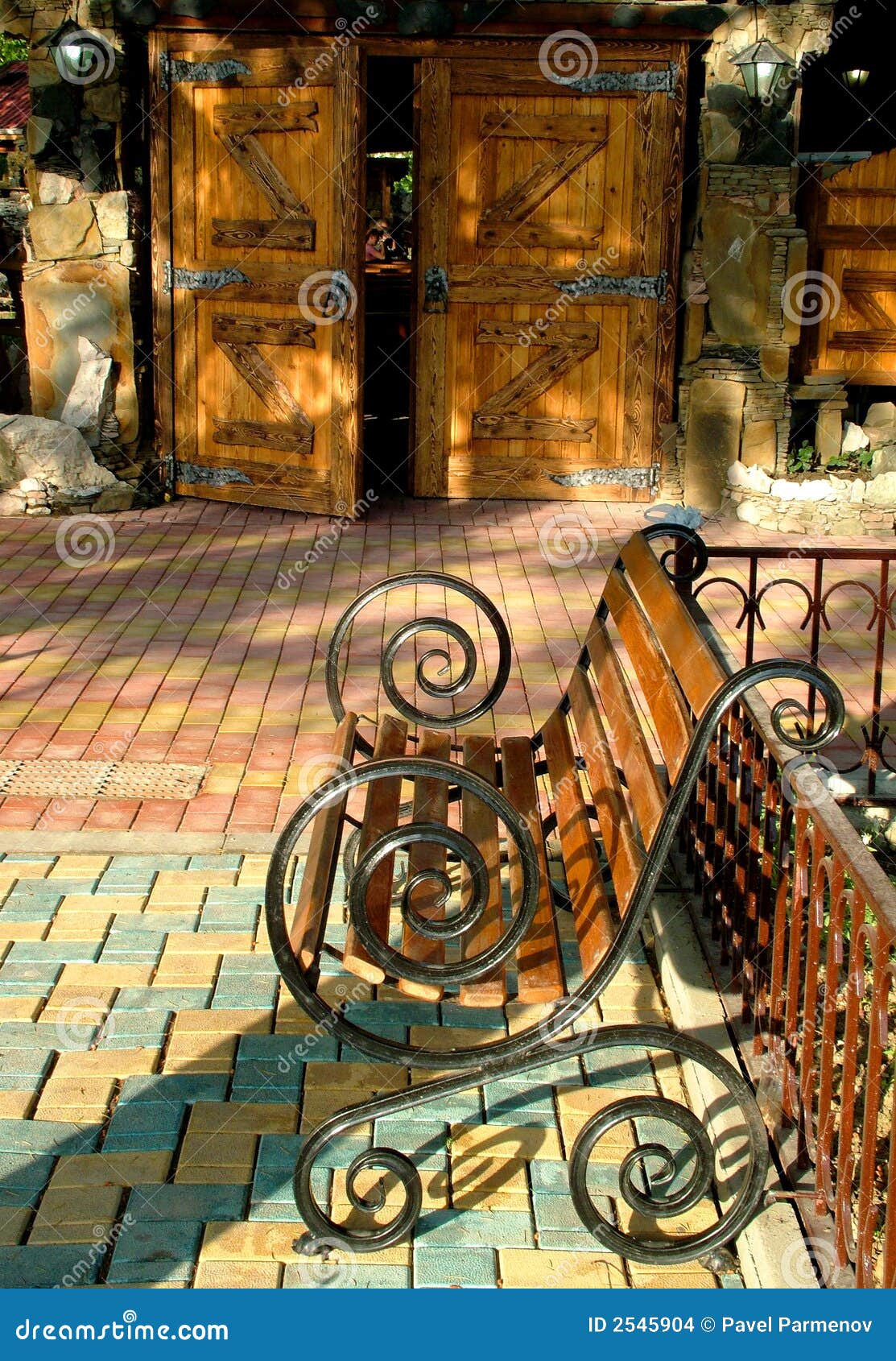 Bench at a gate in cafe stock photo. Image of life, house - 2545904
