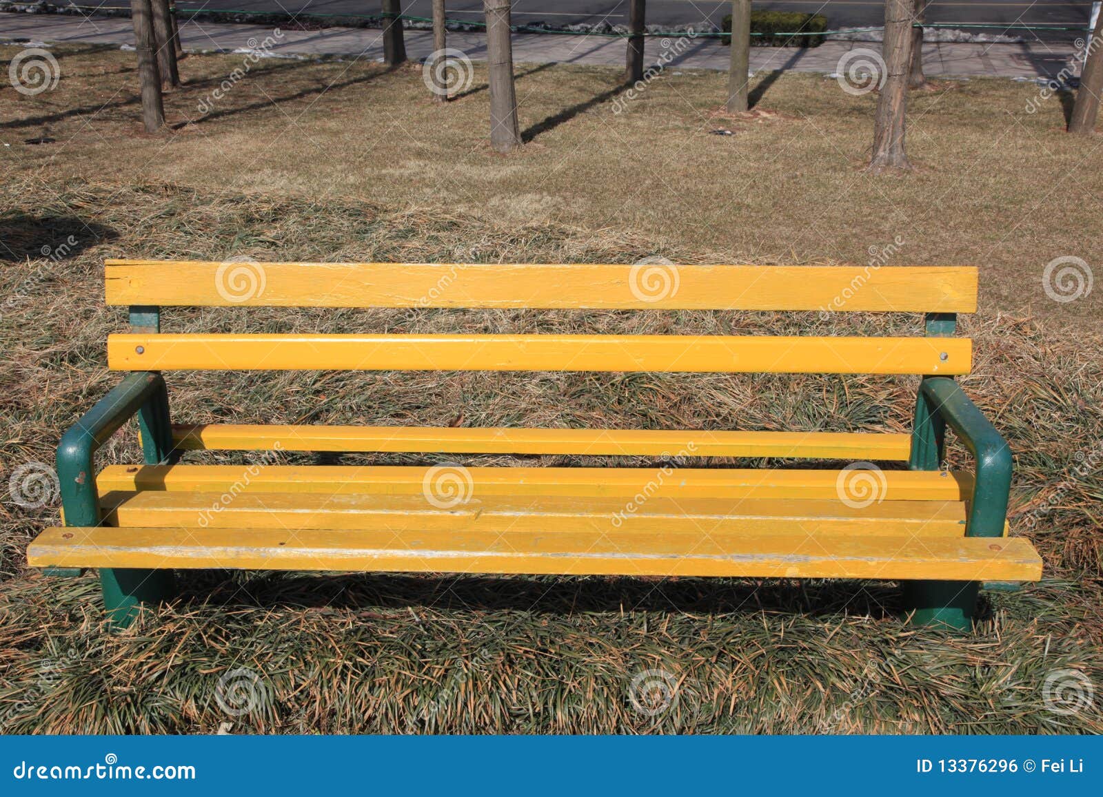 A bench on the grass stock photo. Image of confinement - 13376296