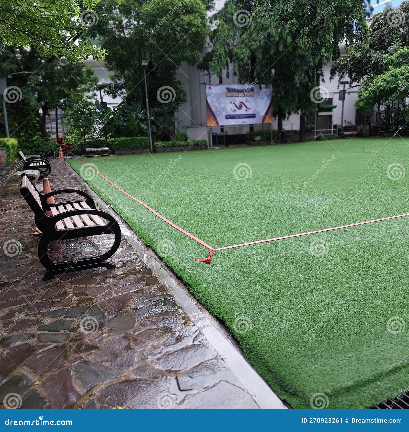 A bench in a ground editorial photo. Image of tree, walkway - 270923261