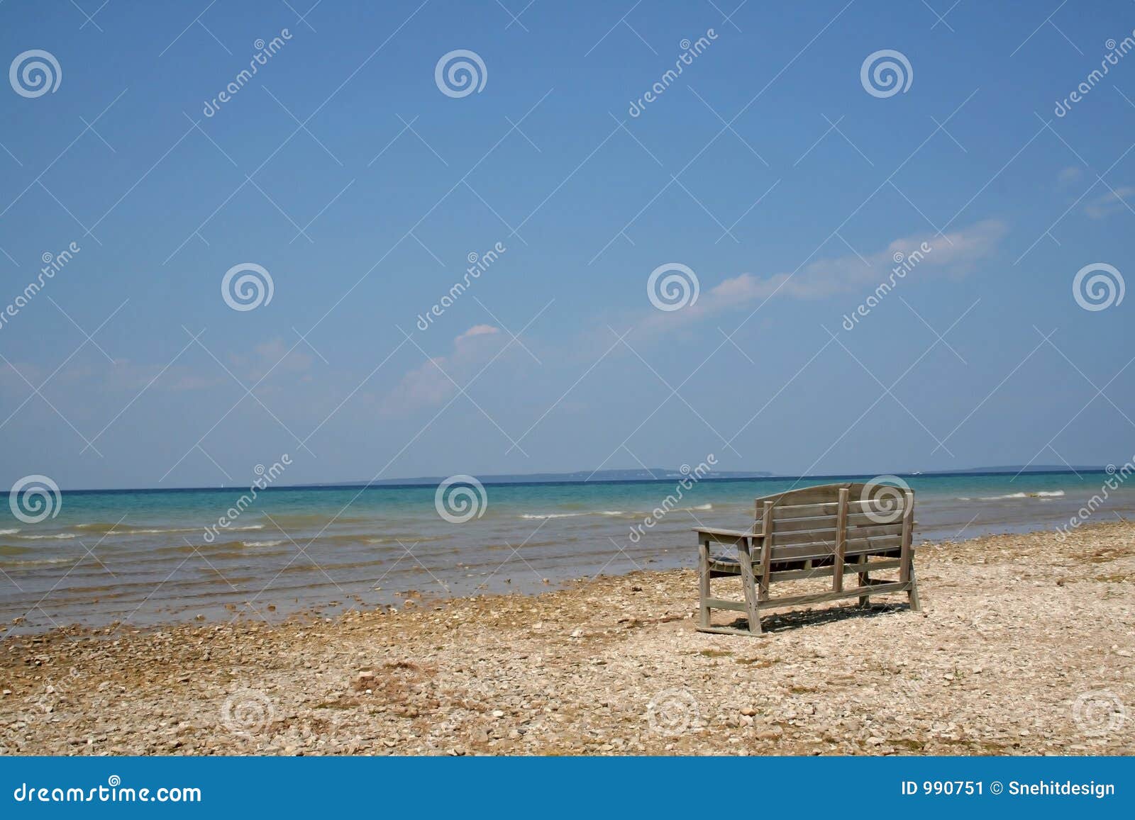 A bench on lake shore stock image. Image of connection - 990751