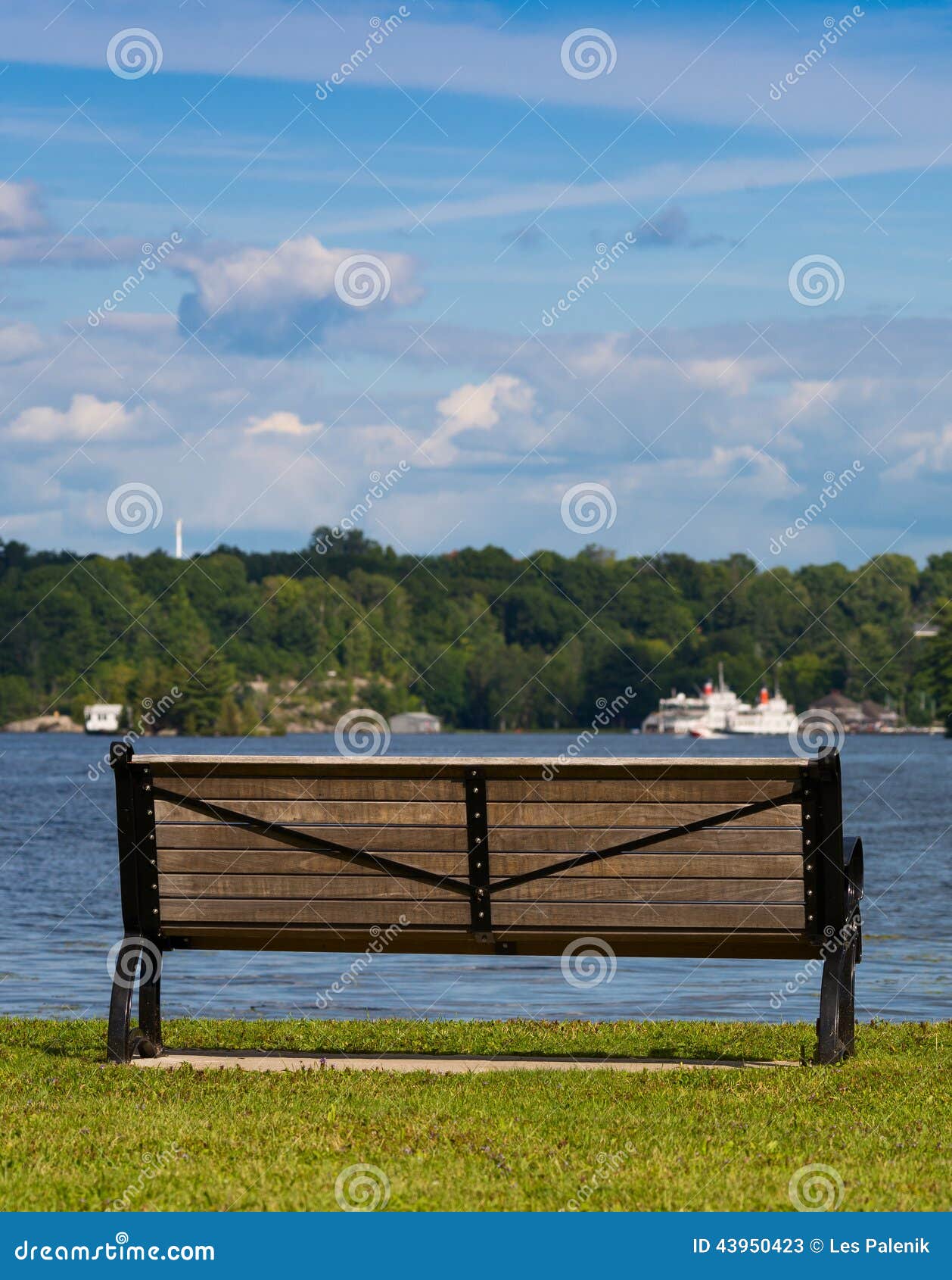 Bench at the lake shore stock image. Image of shore, shoreline - 43950423