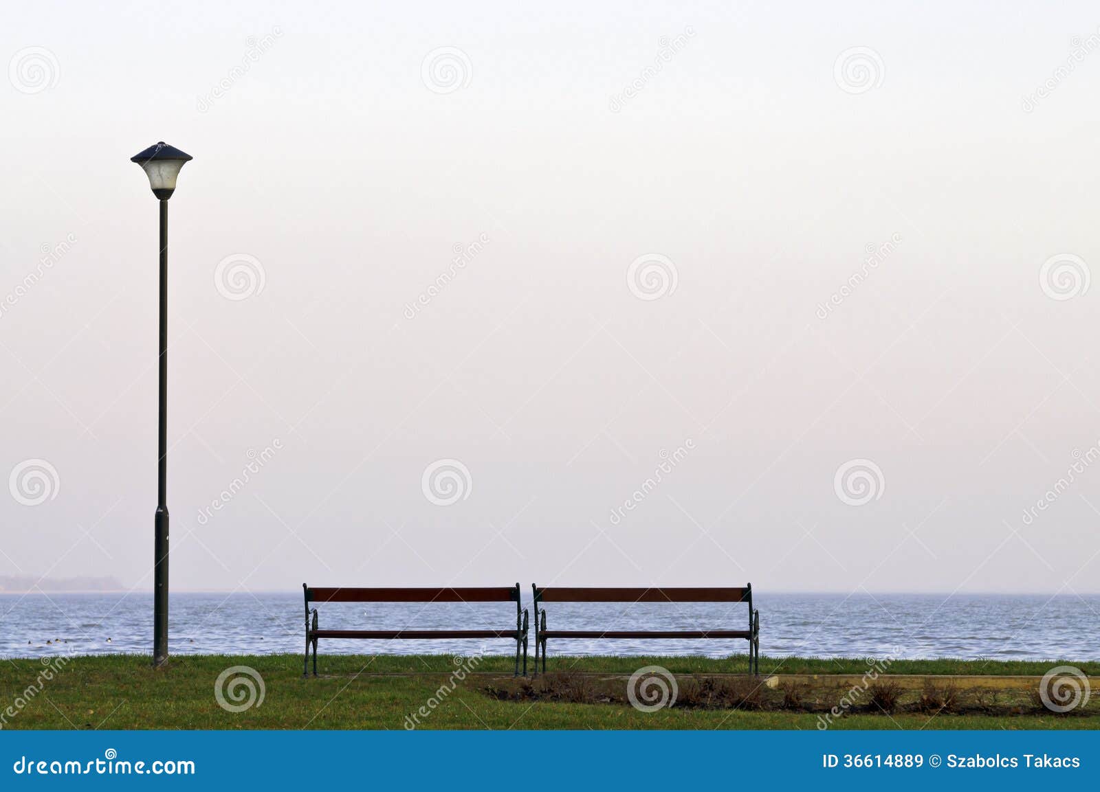 Bench and Lamp Post at Lakeside Horizontal Stock Image - Image of ...