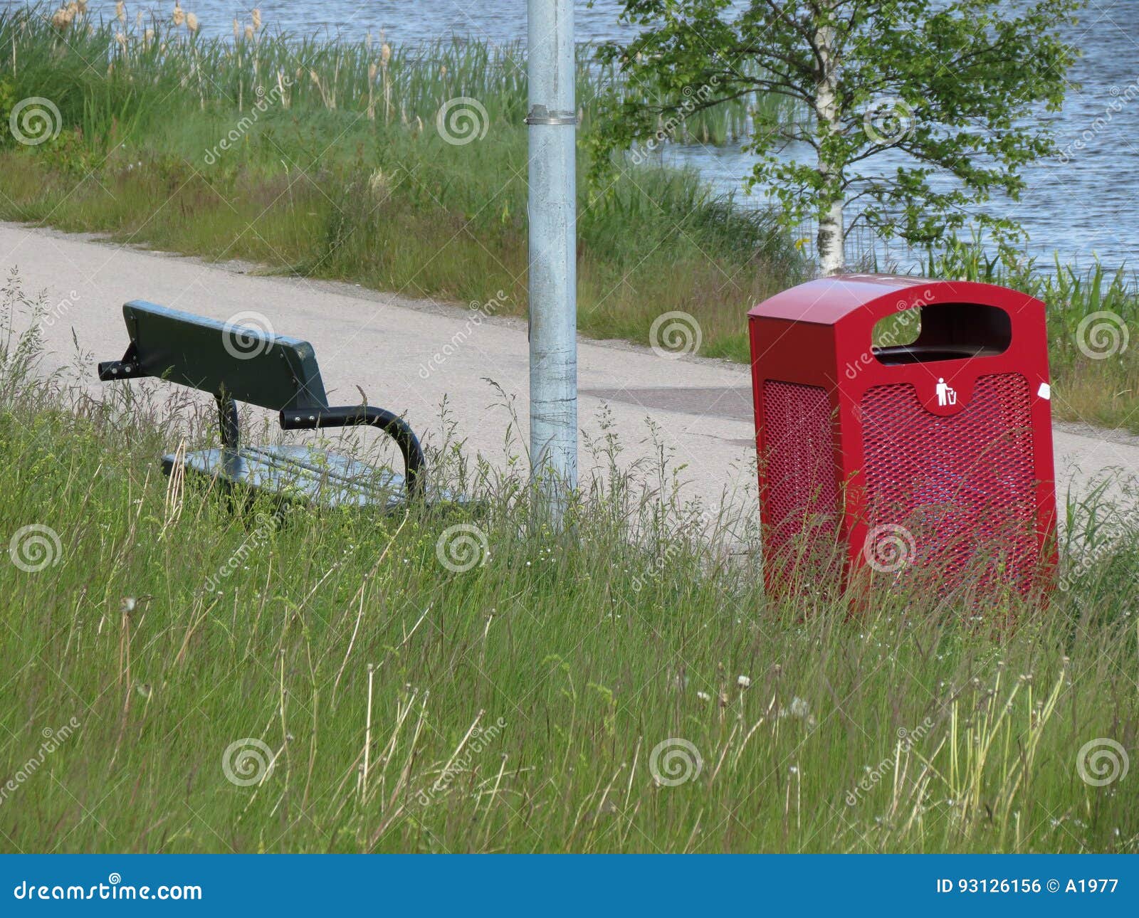 Bench and Litter Box in a Park Stock Photo - Image of europe, bench ...