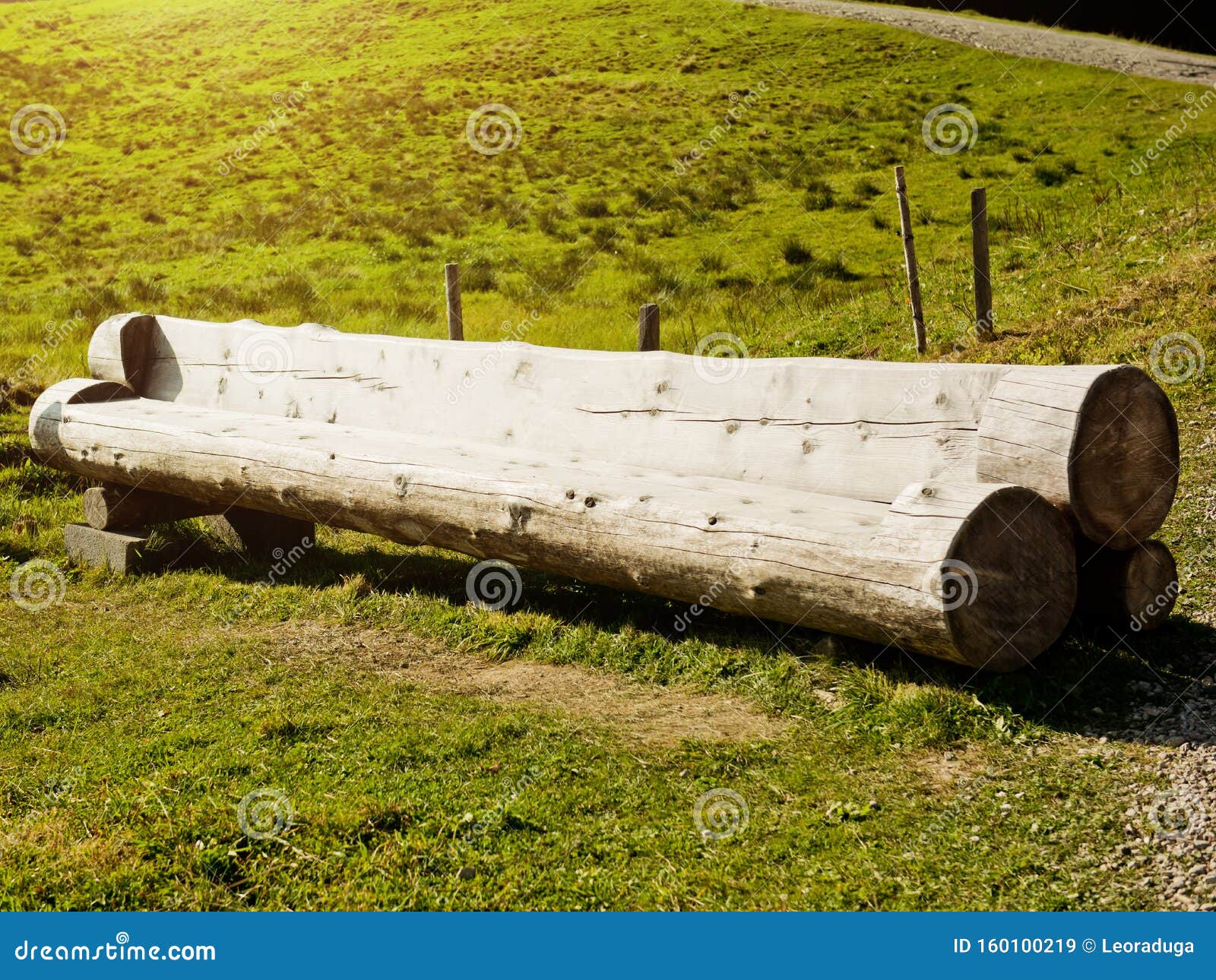 A Bench Made of Logs on the Side of a Mountain. Stock Image - Image of ...