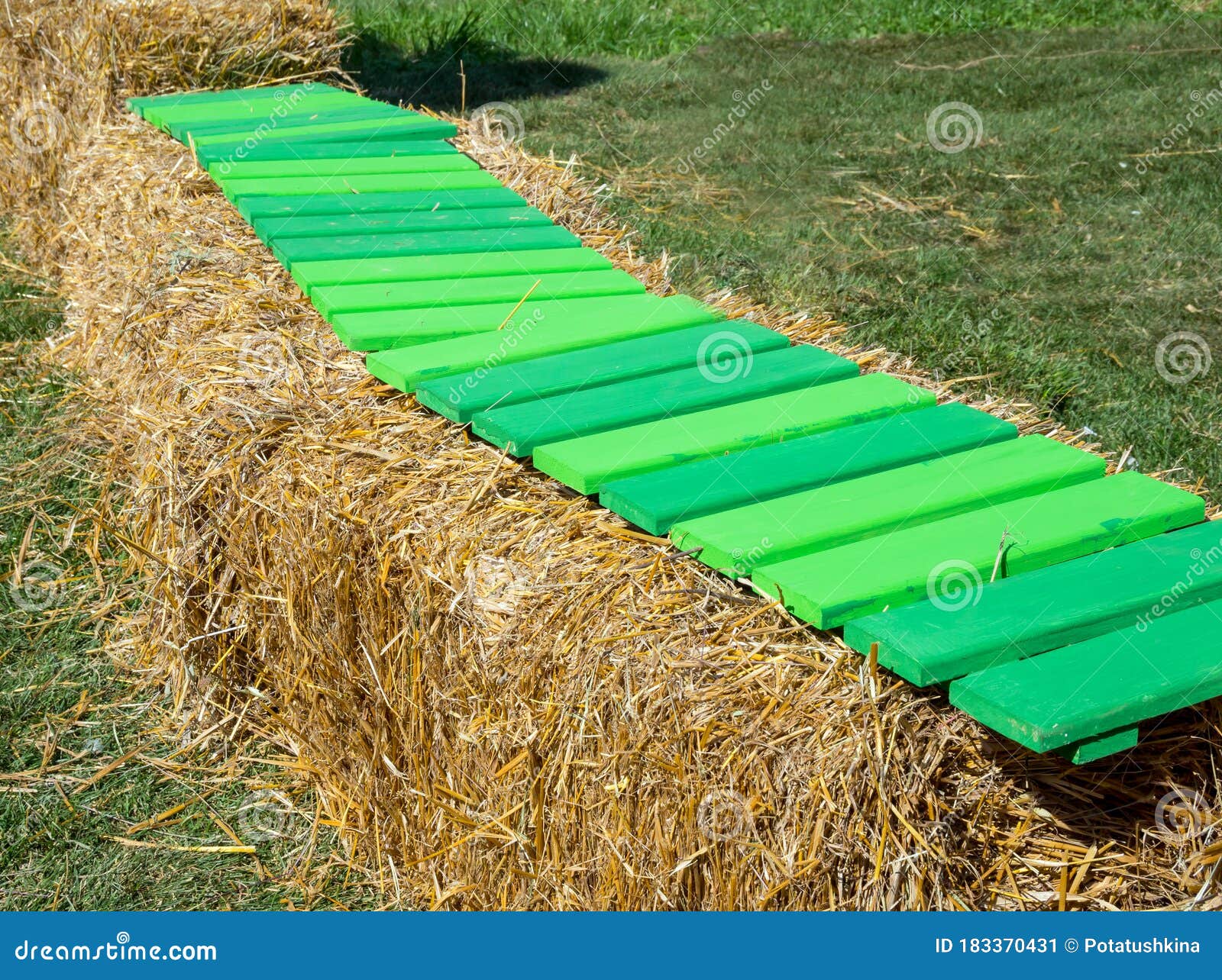 Bench Made from Straw Bales and Wooden Planks Stock Image - Image of ...