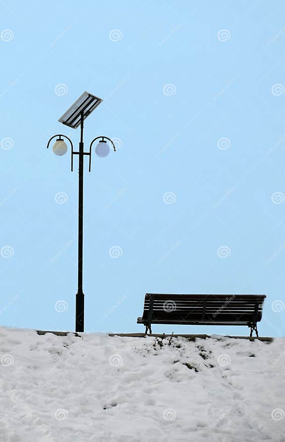 Bench near a light pole stock image. Image of city, shore - 38313507