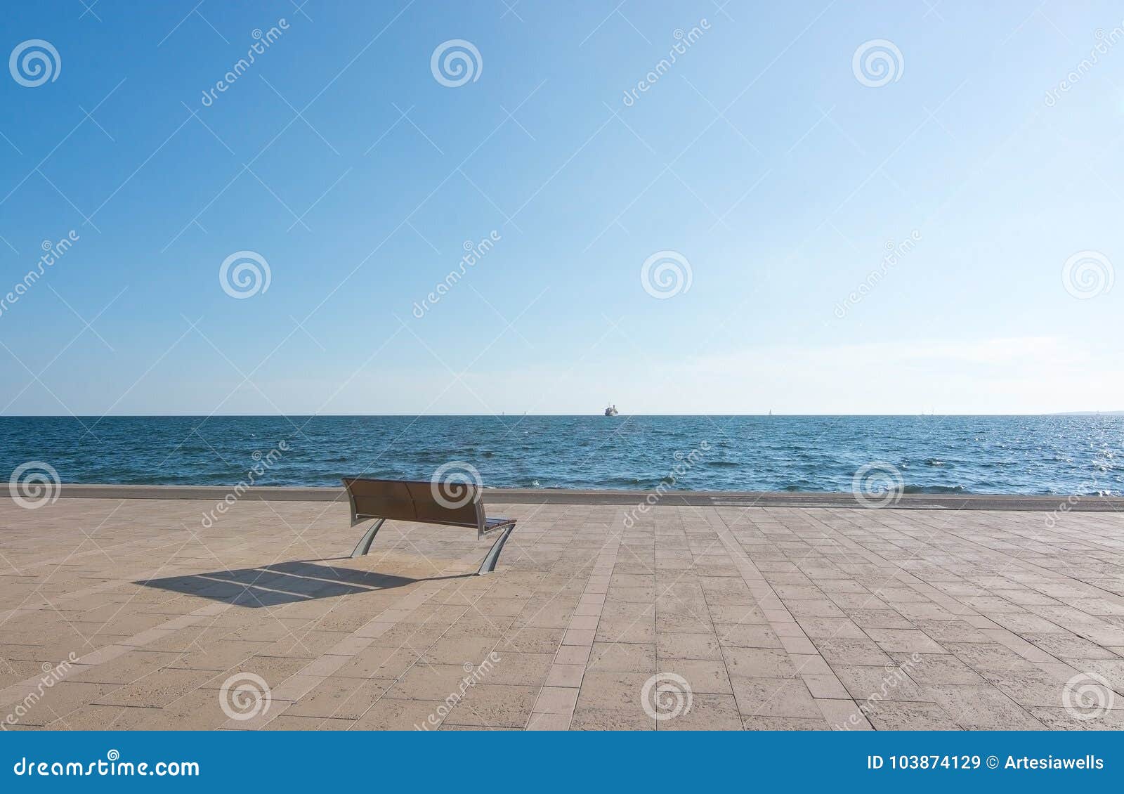 Bench and ocean horizon stock image. Image of sparse - 103874129