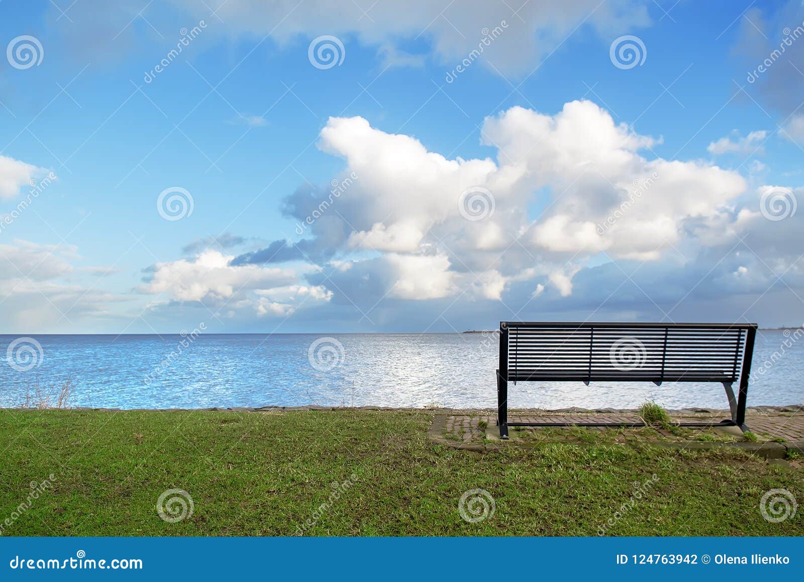Bench Overlooking the Sea with Clouds Stock Photo - Image of blue ...