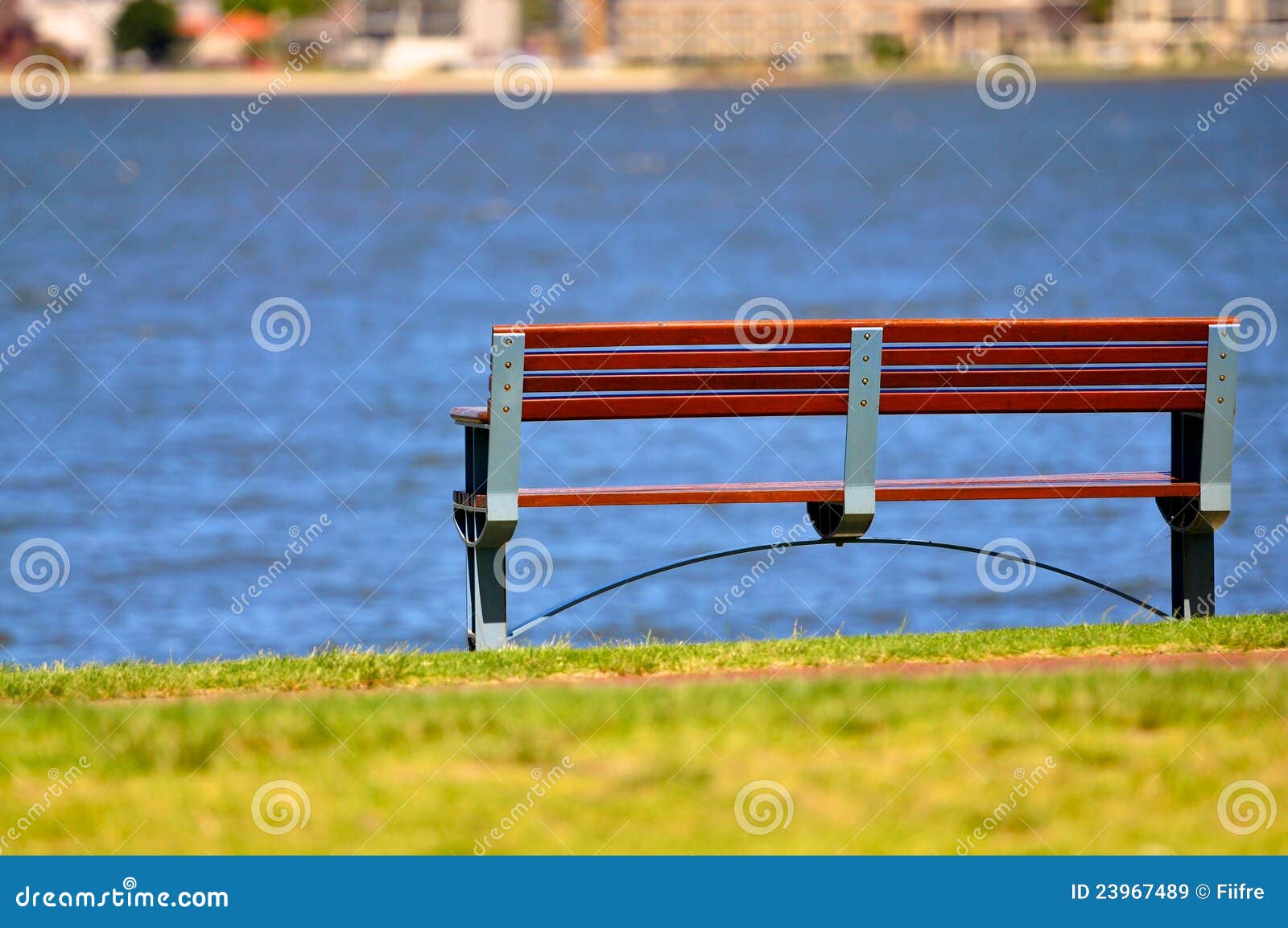 Bench in park near water stock image. Image of empty - 23967489