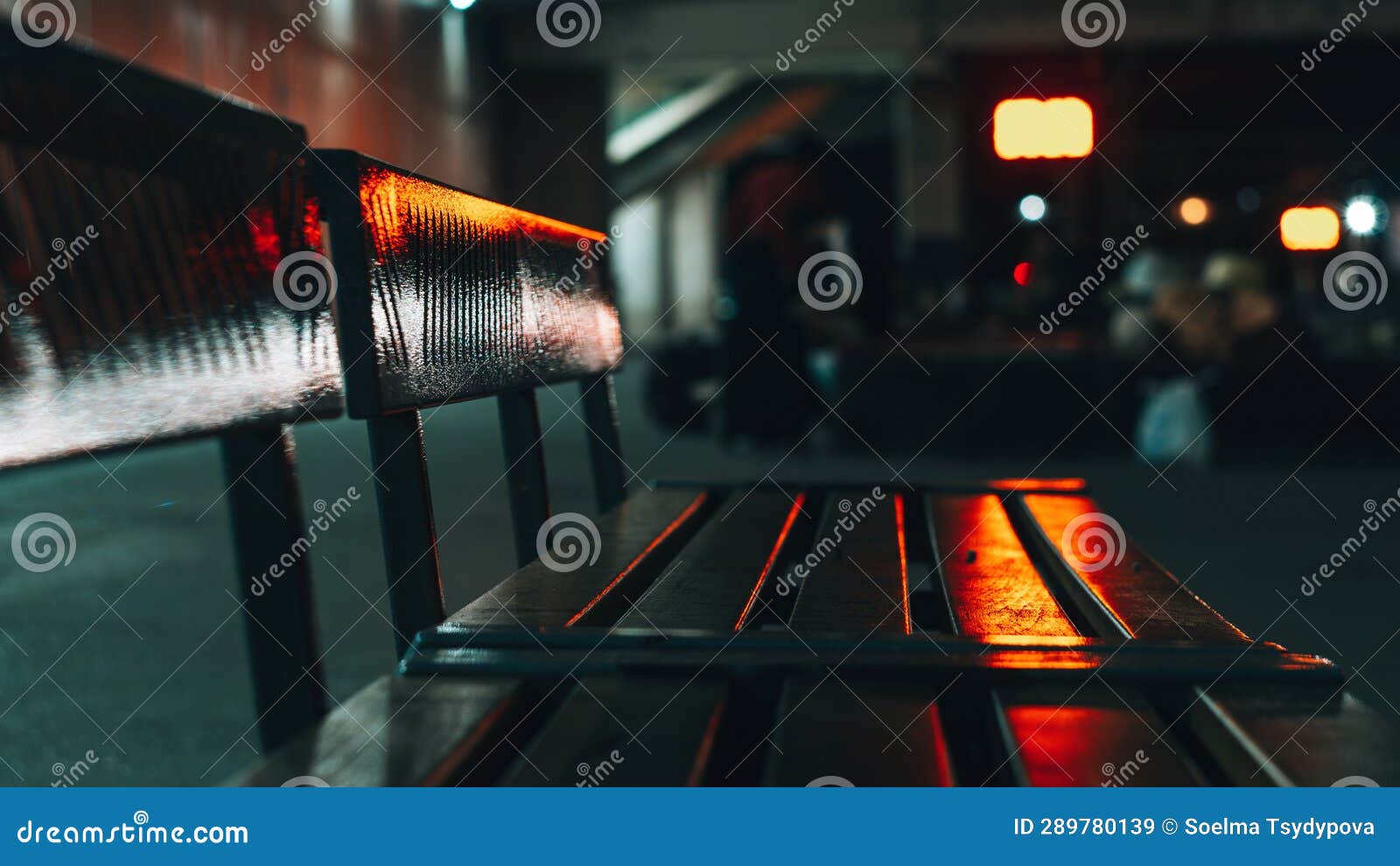 Bench Reflection Night Lights. Red Lights in the Background Bokeh ...