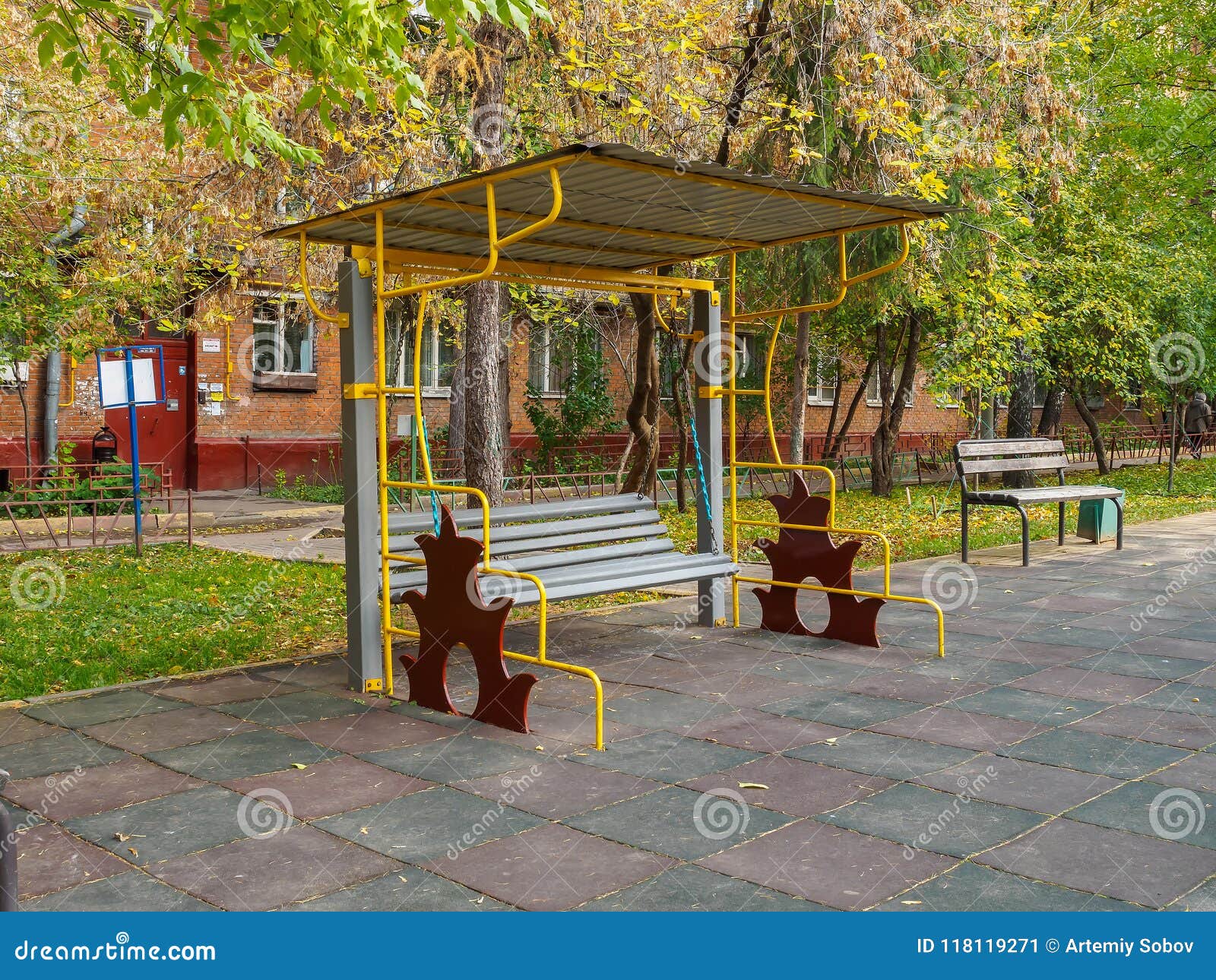 A Bench with a Roof for Rest in the Yard. Stock Image - Image of roof ...