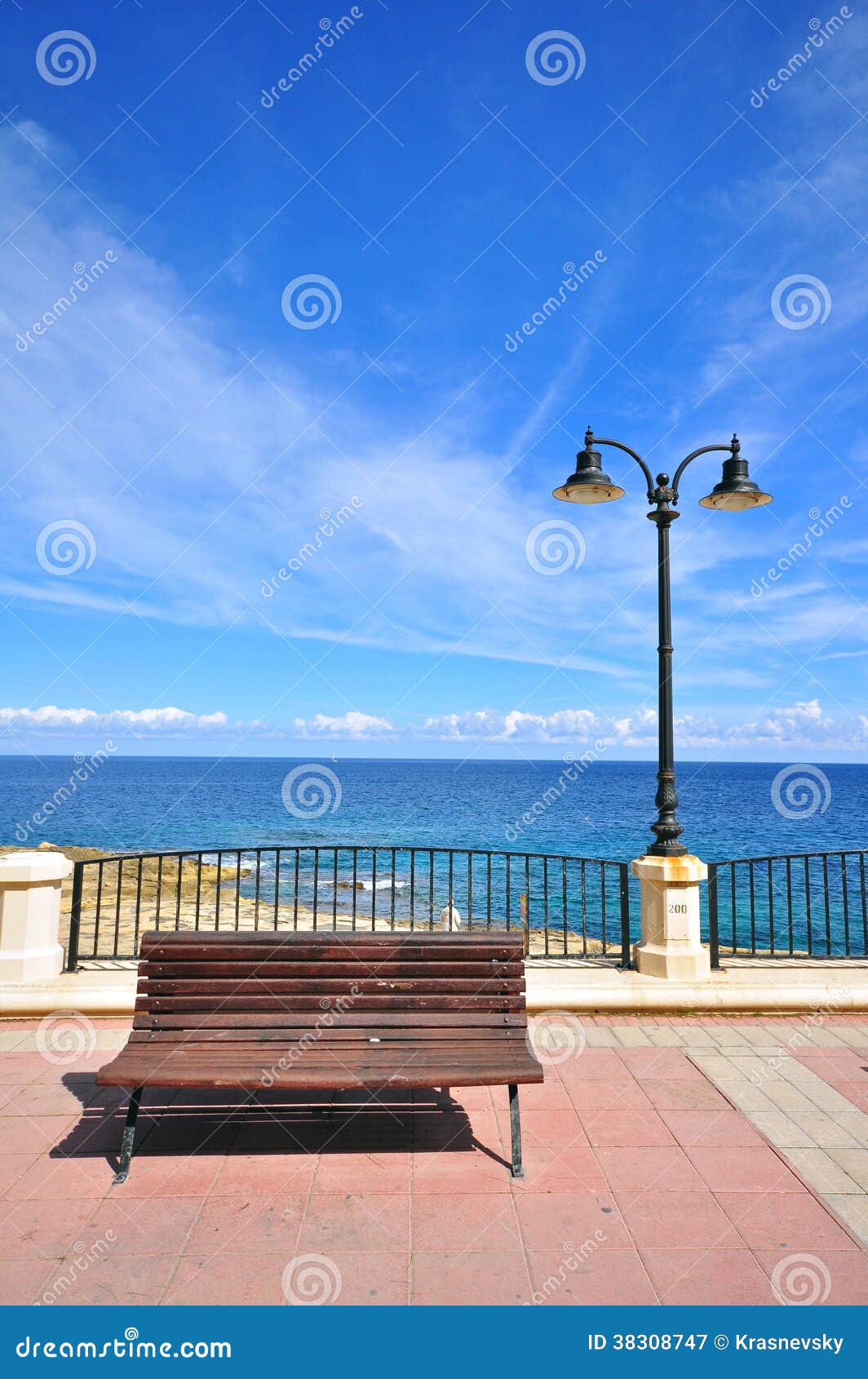 Bench at the seafront stock image. Image of light, coastline - 38308747