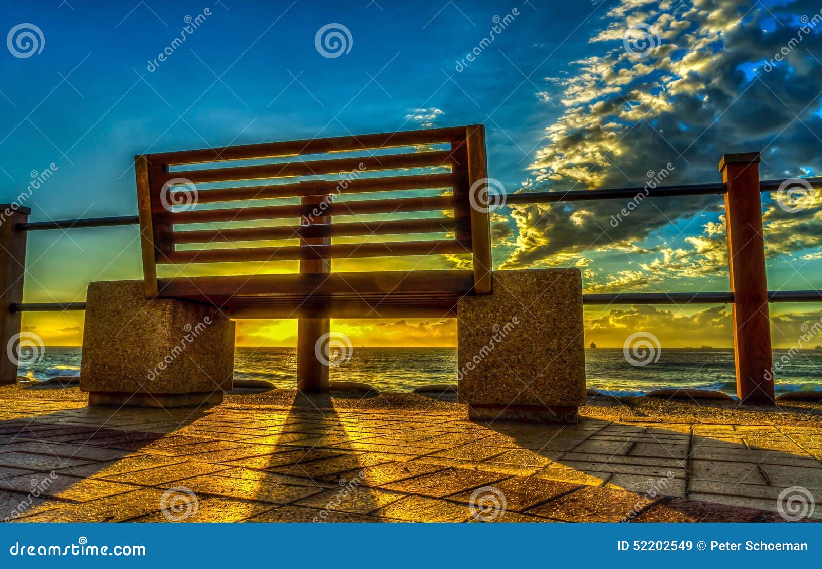 Bench at the seaside stock image. Image of bench, clouds - 52202549