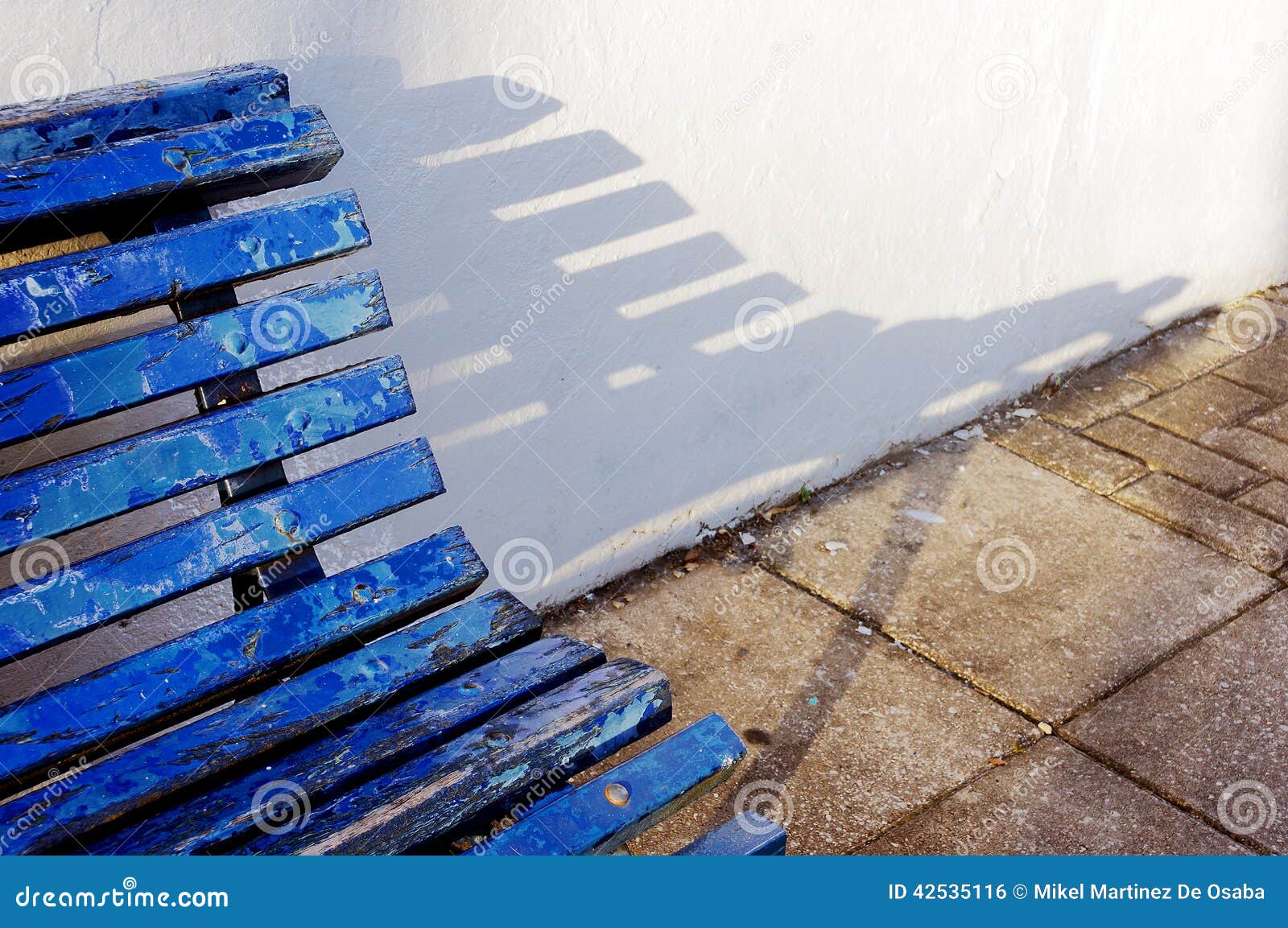 Bench and shadow stock photo. Image of sunny, wall, park - 42535116