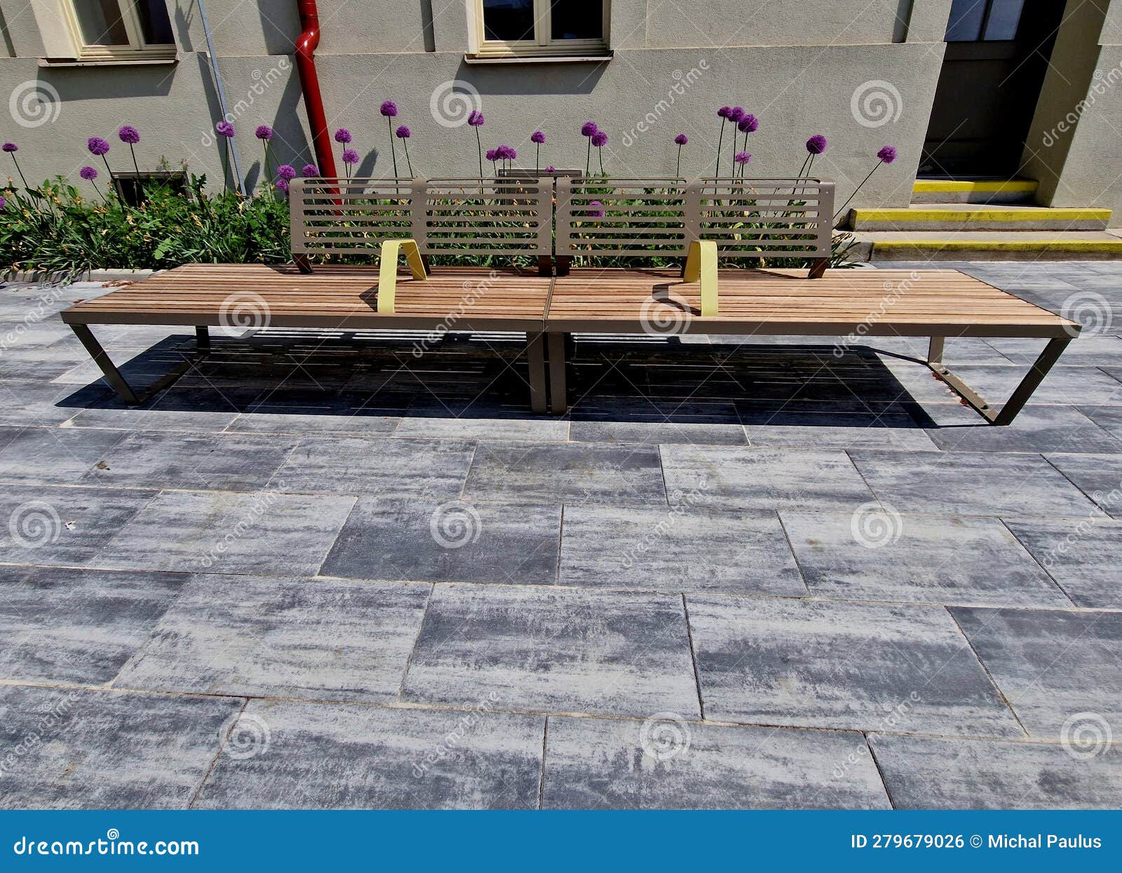 A Bench in the Square or by the Station. the Bench is Divided into ...