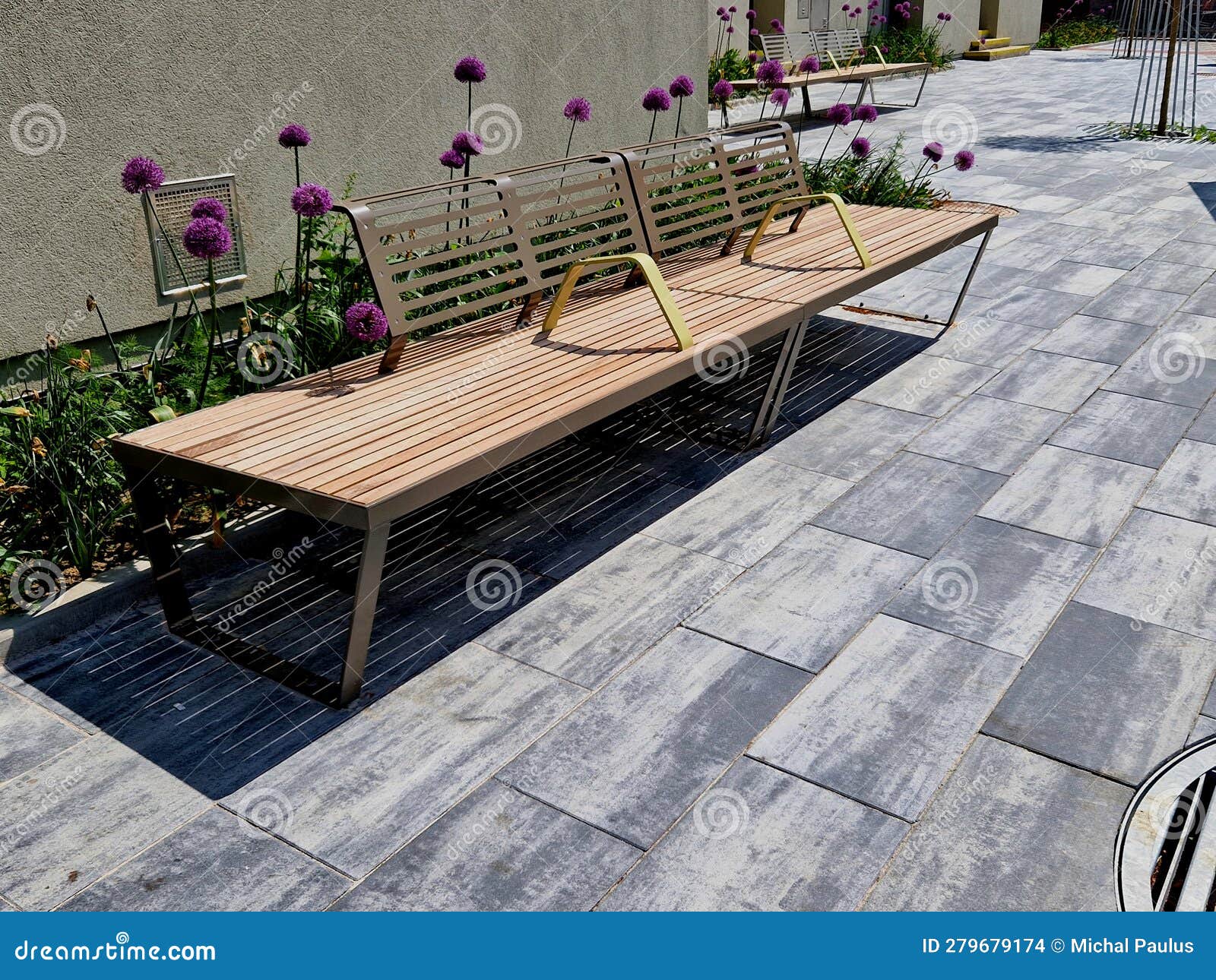 A Bench in the Square or by the Station. the Bench is Divided into ...