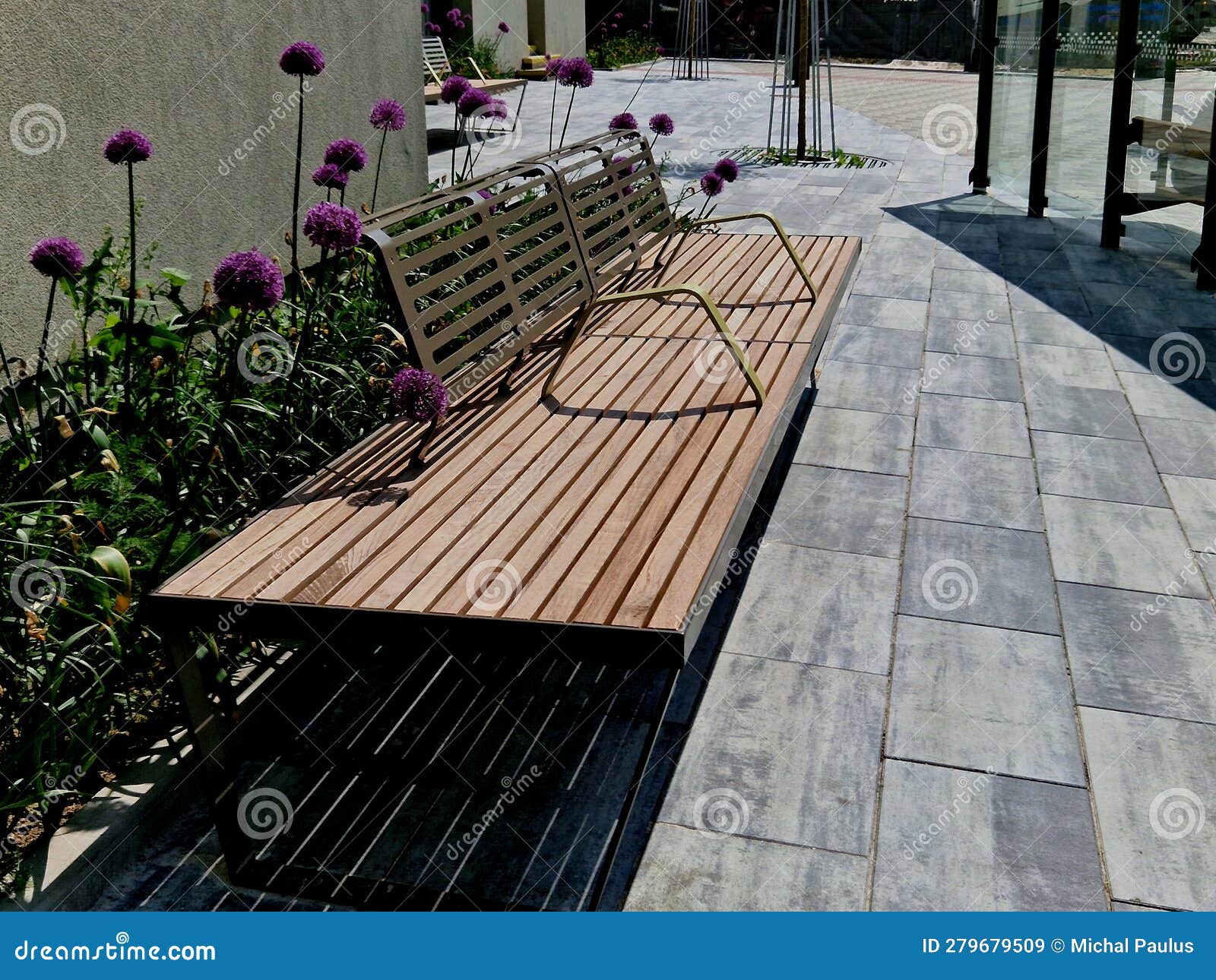 A Bench in the Square or by the Station. the Bench is Divided into ...