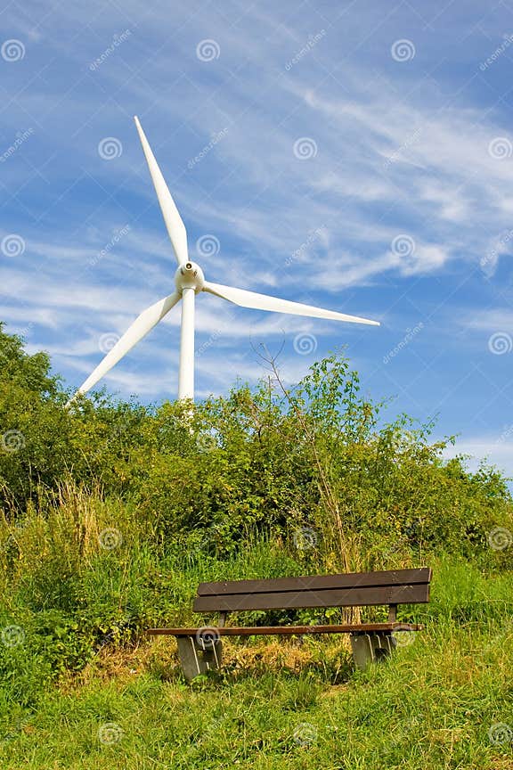 Bench and wind turbine stock photo. Image of renewable - 26124252