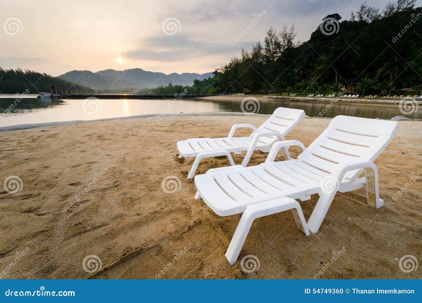 Benches on the beach stock photo. Image of scenery, sunlight - 54749360