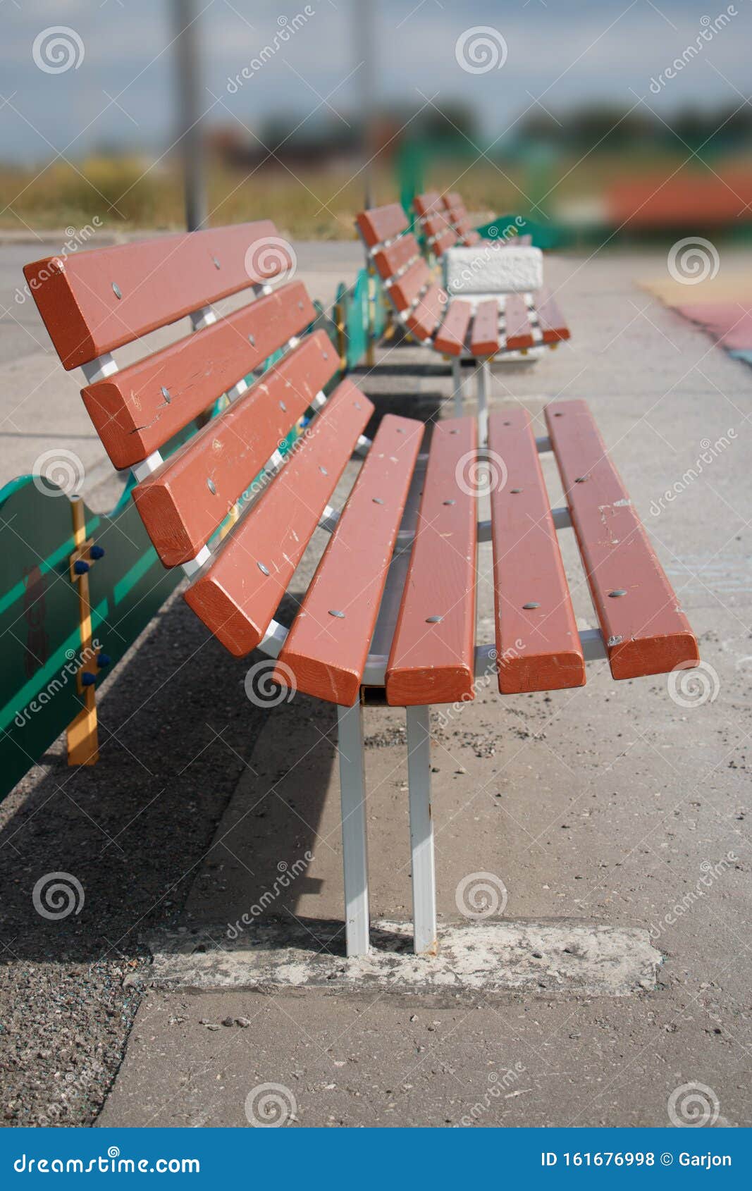 Benches Stand in a Row in the Park Stock Photo - Image of concrete ...