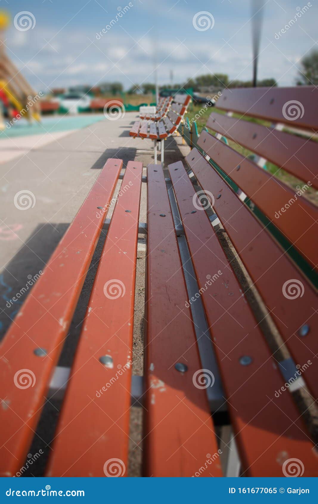 Benches Stand in a Row in the Park Stock Image - Image of sidewalk ...