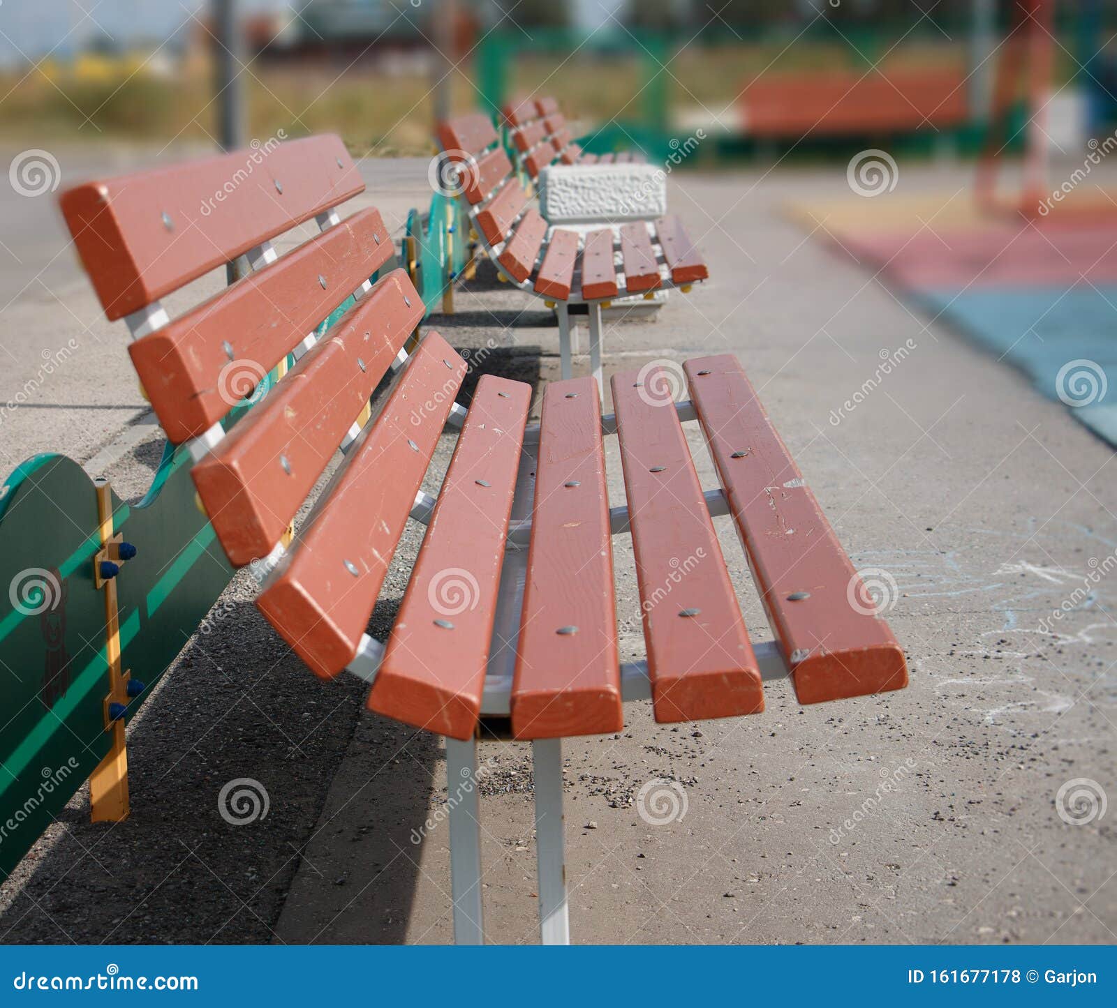 Benches Stand in a Row in the Park Stock Photo - Image of bench ...