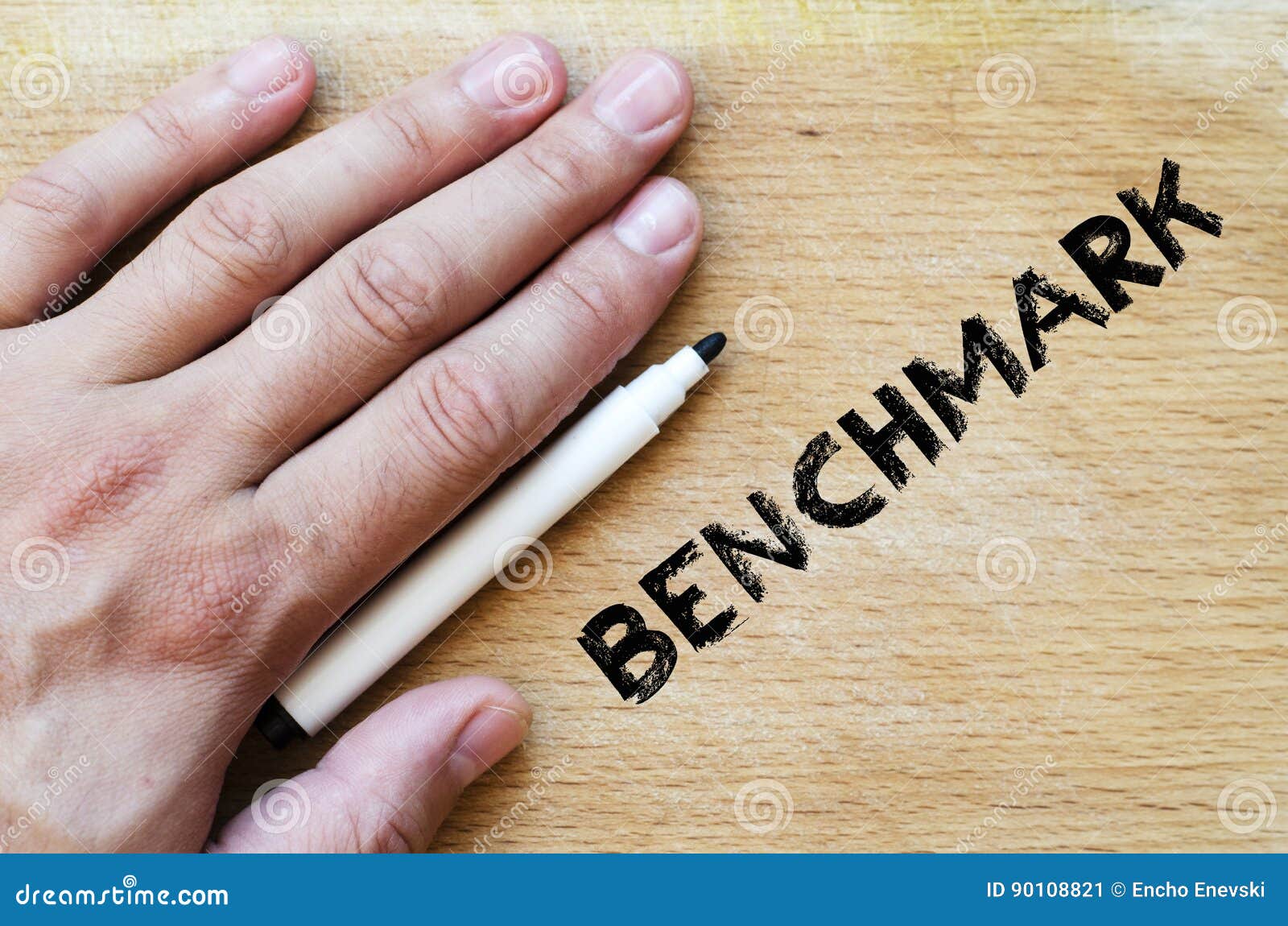 Benchmark - Text Written On A Notebook With Office Background Royalty ...