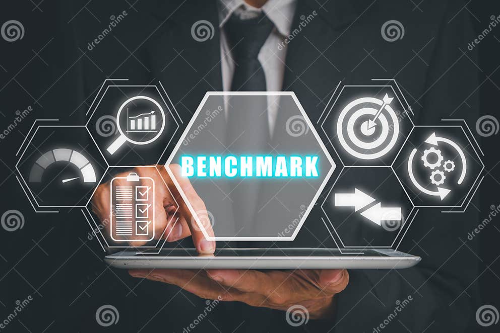 Businessman Hand Touching on Tablet Computer with Benchmarking Icon on ...