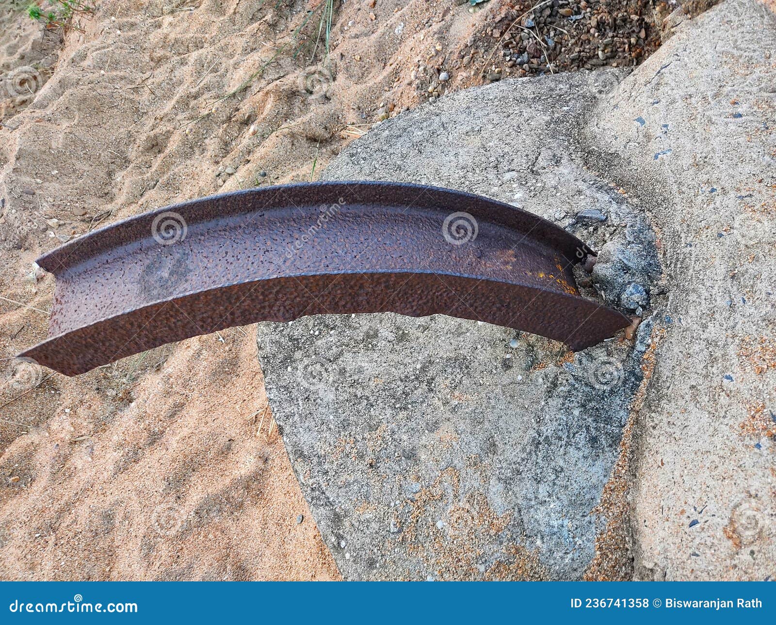 A Bend Electric Pole Attached To Concrete at Base Stock Photo - Image ...