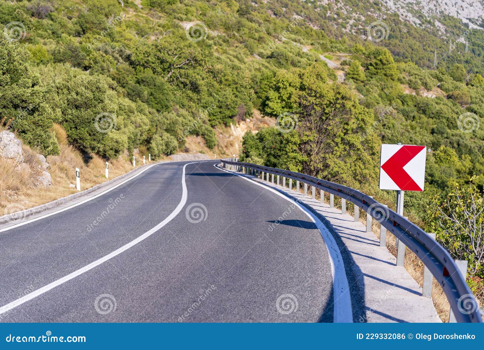 Bend Road Warning Sign on the Mountain Road in Summer Time Stock Photo ...