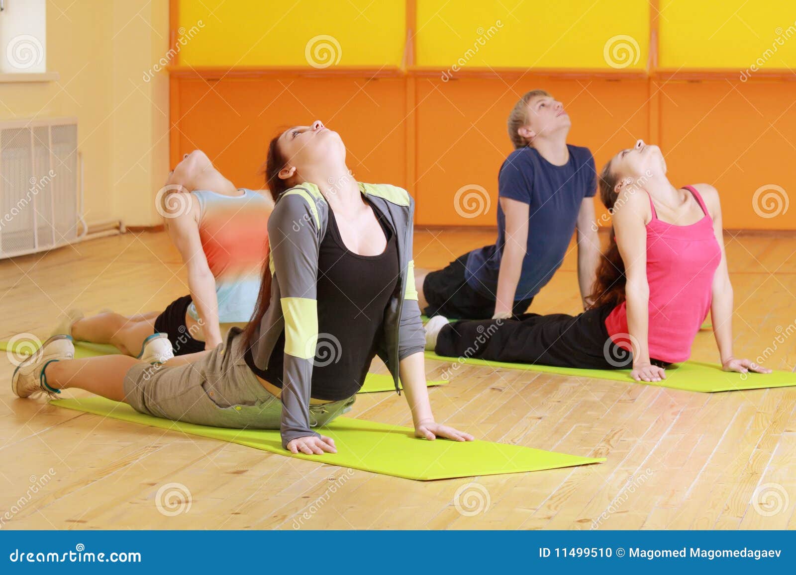 Bending Backs in Group Aerobics Stock Photo - Image of backs, group ...