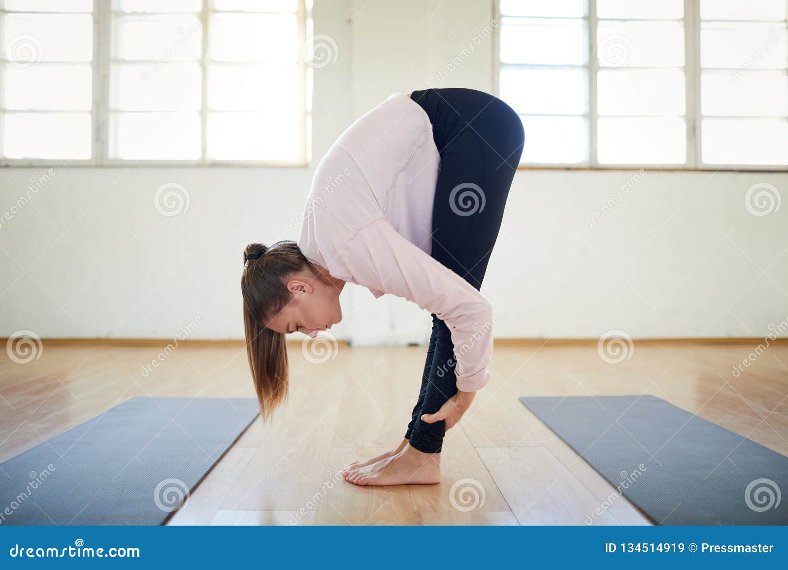 Bending forwards stock image. Image of bending, leisure - 134514919