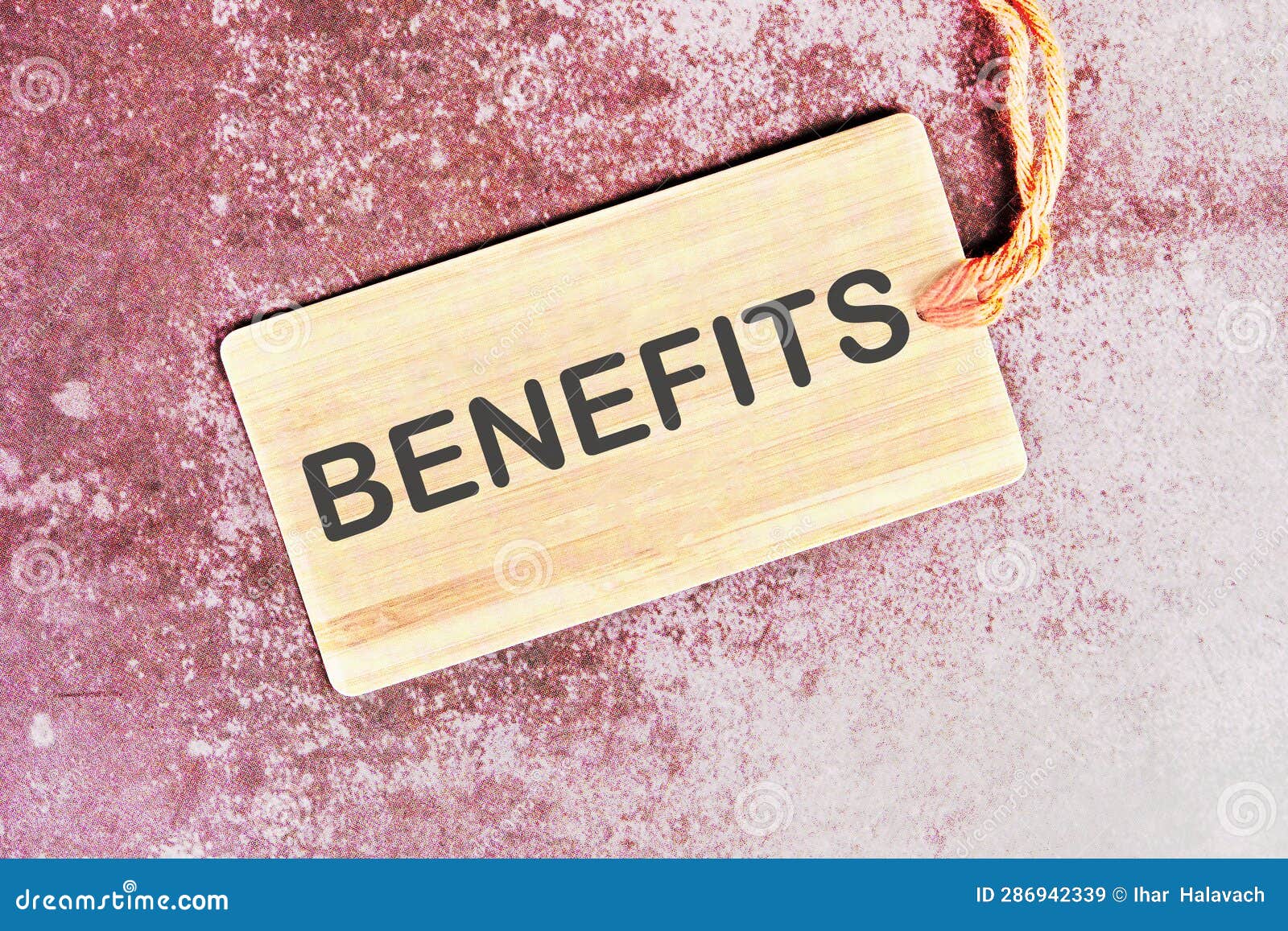BENEFITS Word Written on a Card with a Rope on an Abstract Background ...
