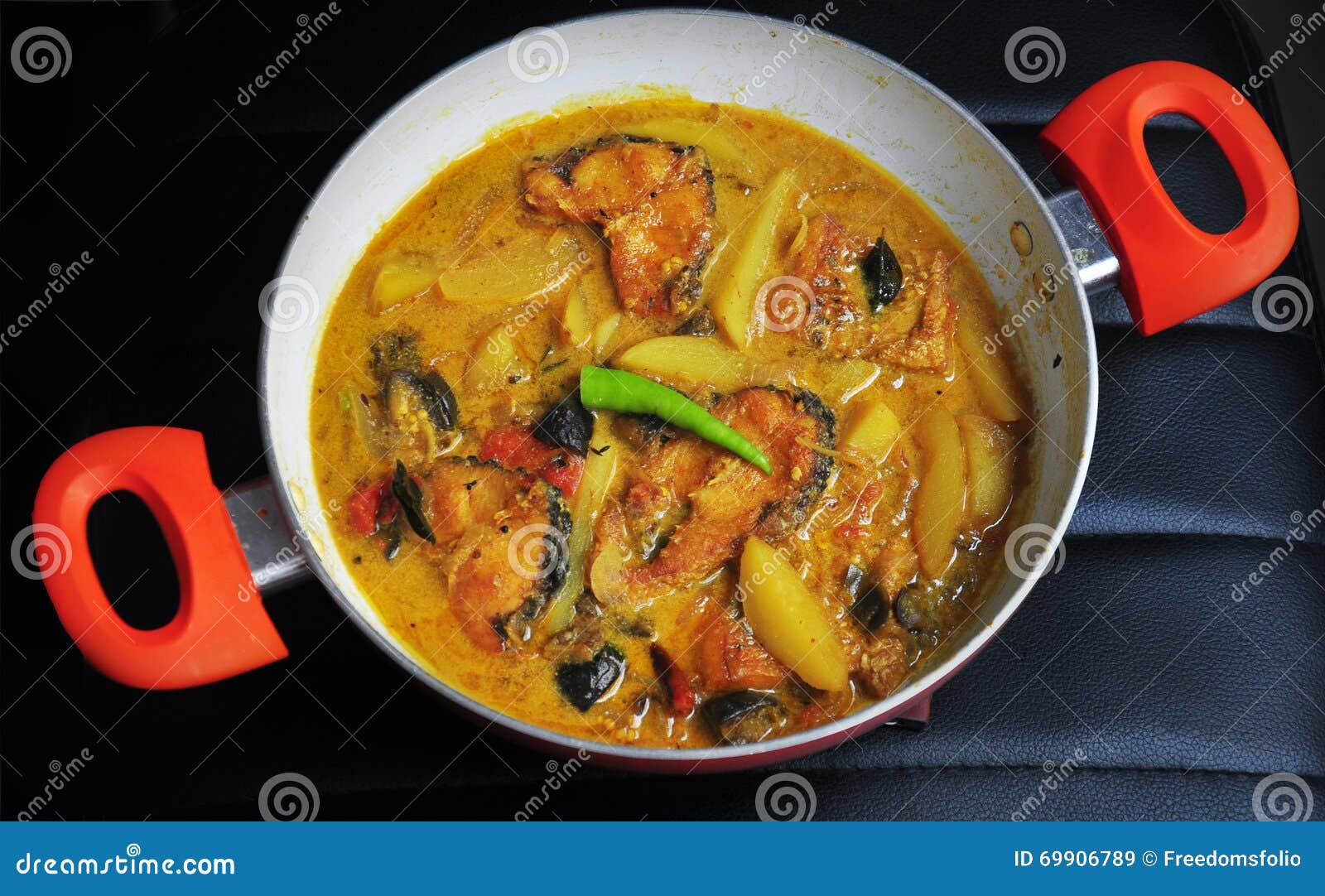 Bengali Fish Curry with Potato and Turmeric Stock Image - Image of ...