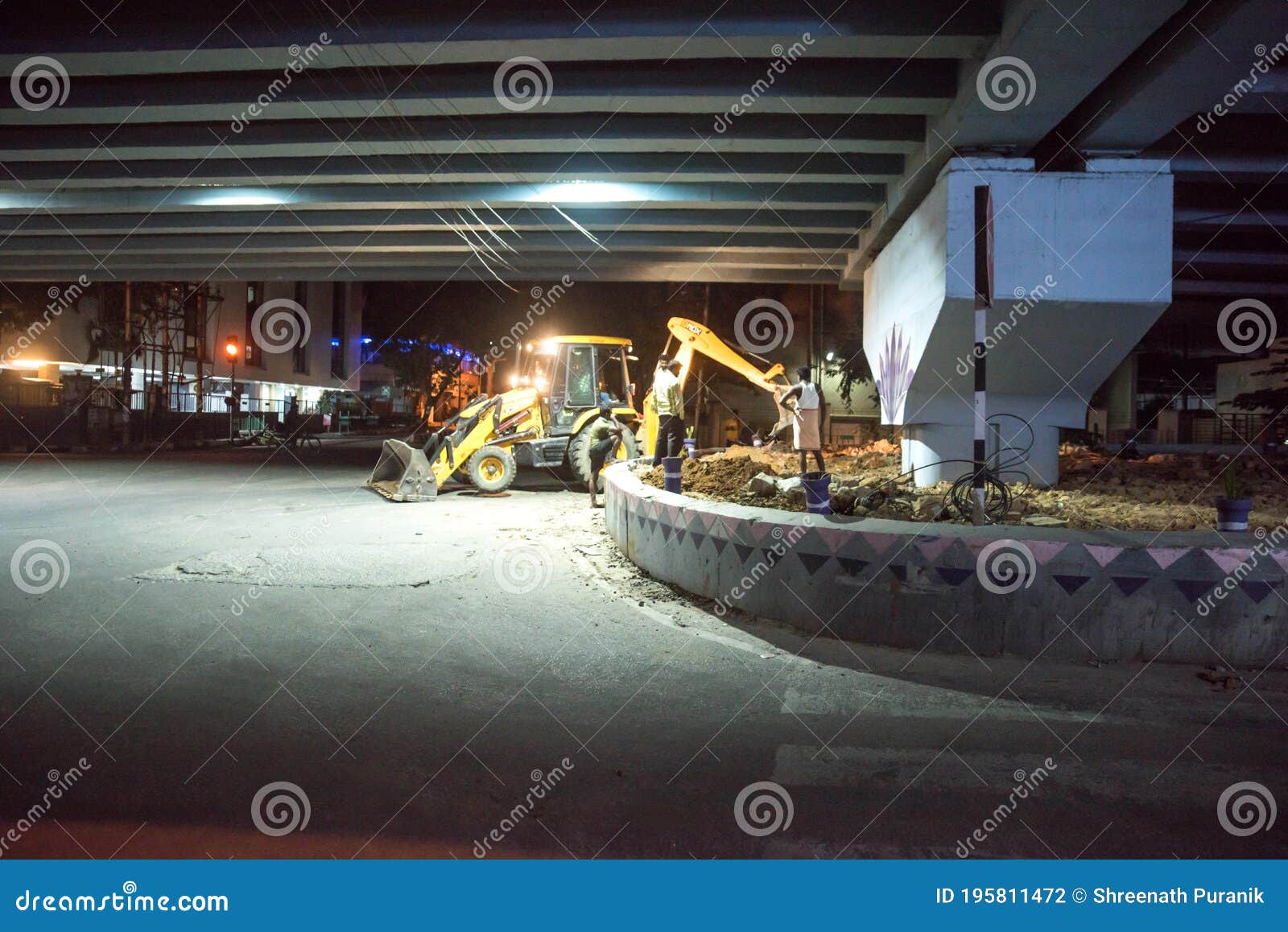 Men at work with JCB editorial photography. Image of lights - 195811472