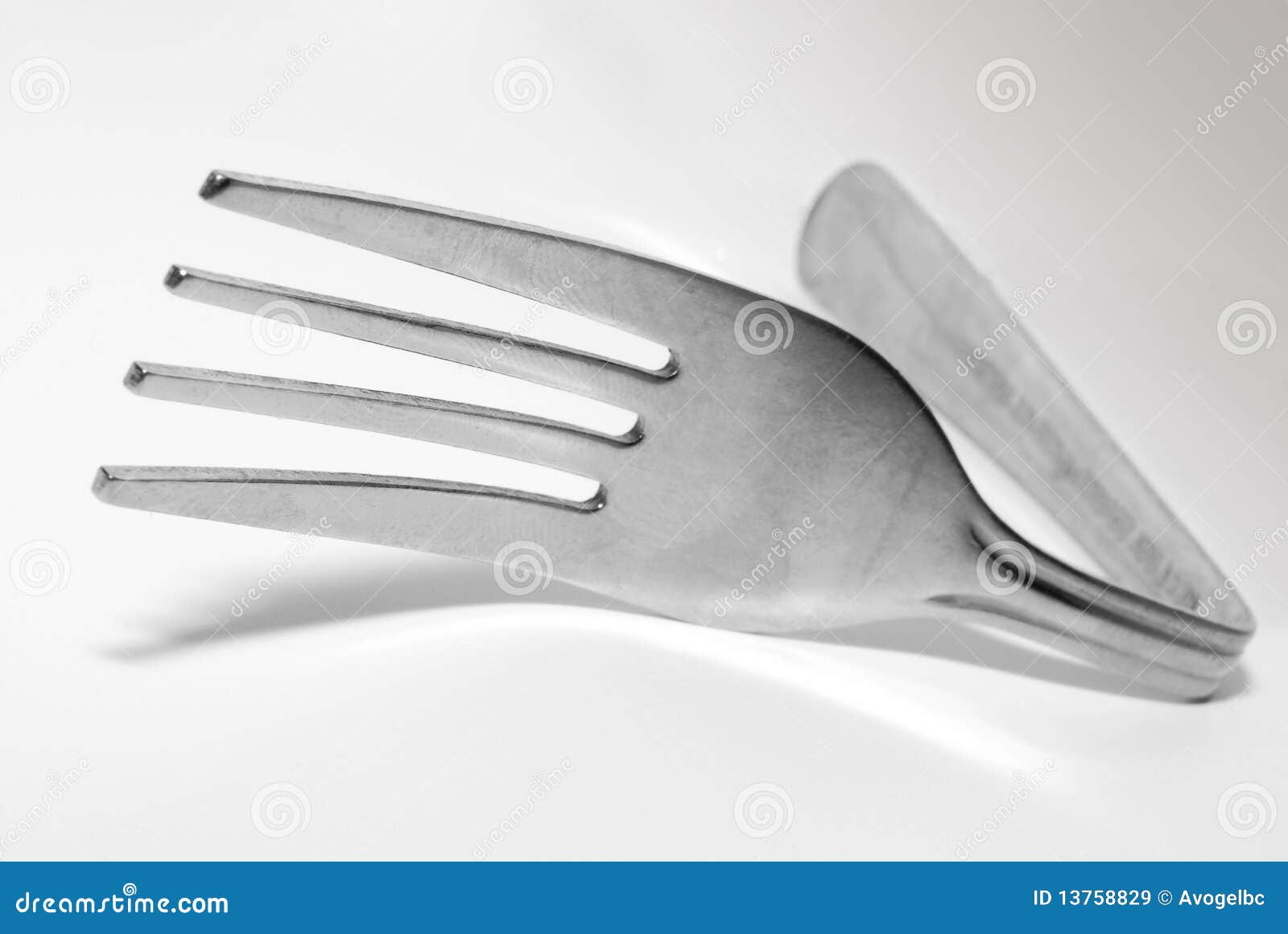 Bent Silver Fork stock image. Image of meal, dinner, four - 13758829