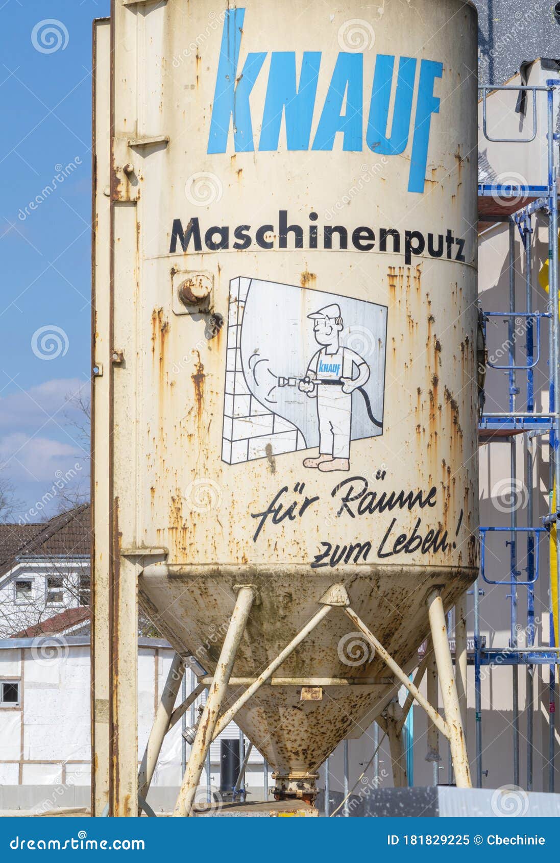 Construction Site with Outdated and Rusty Silo, from Which the Plaster ...